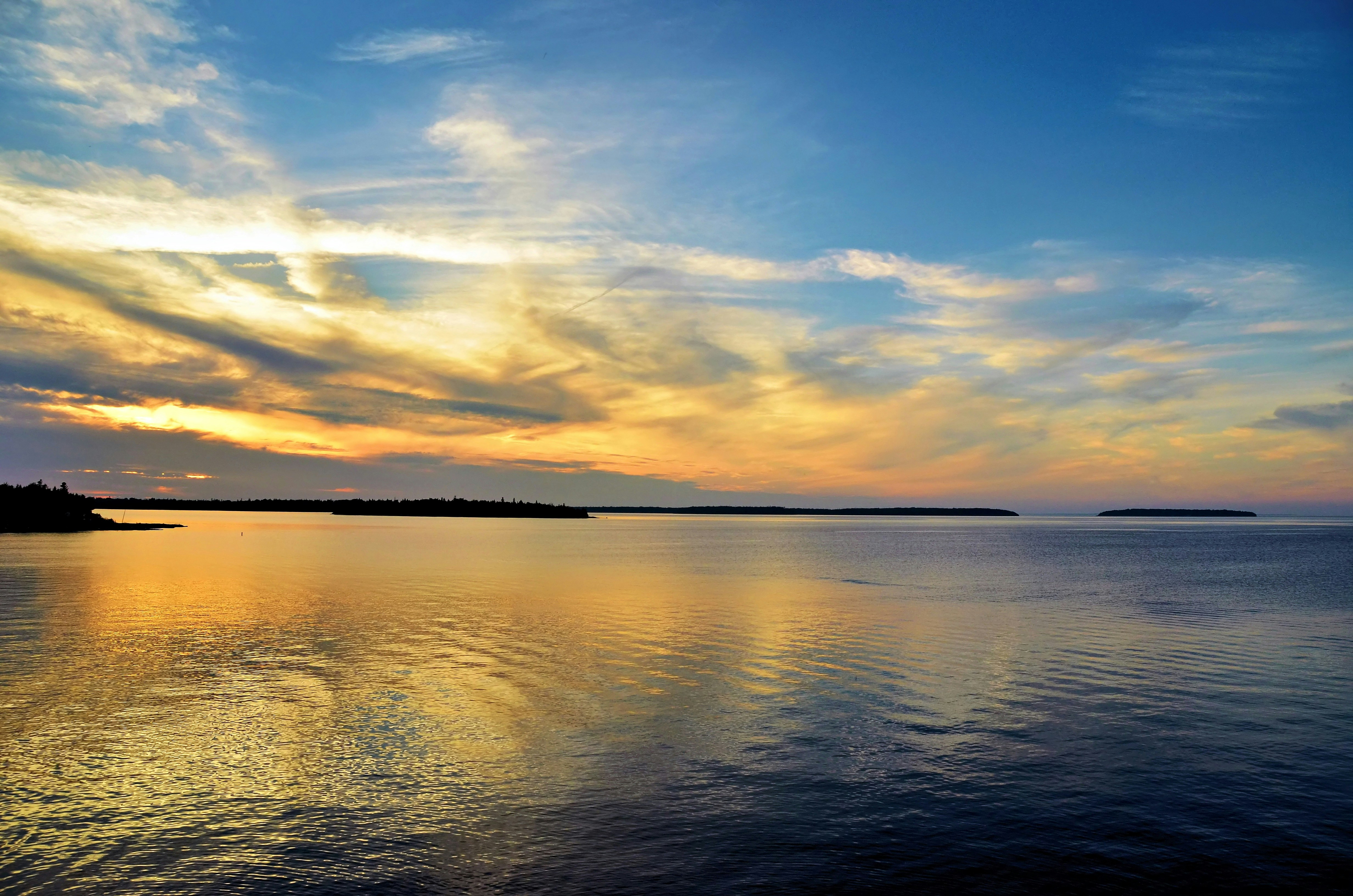 Golden Horizon Over Calm Waters