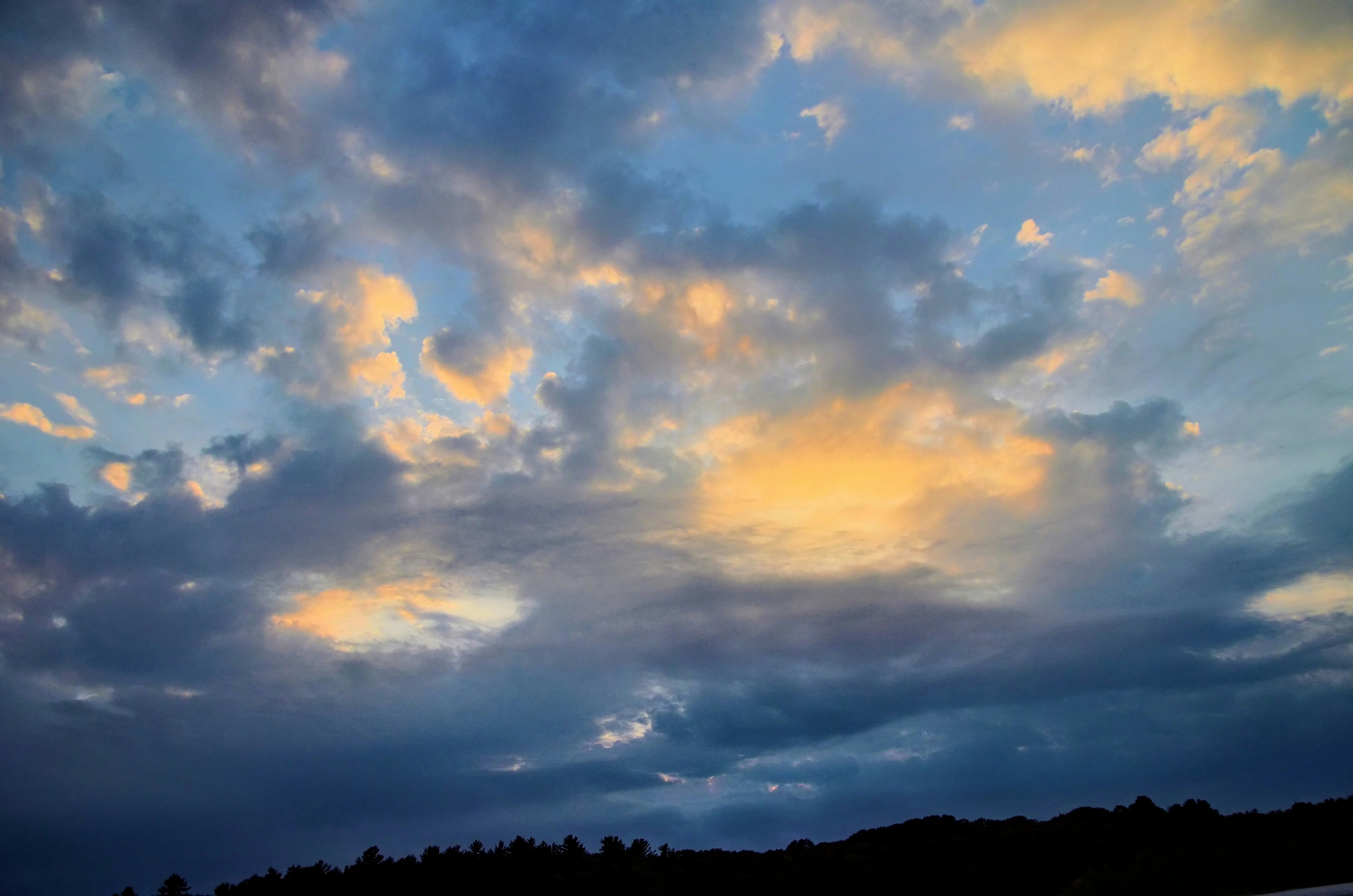 Dawn-lit Sky Over Quiet Horizon