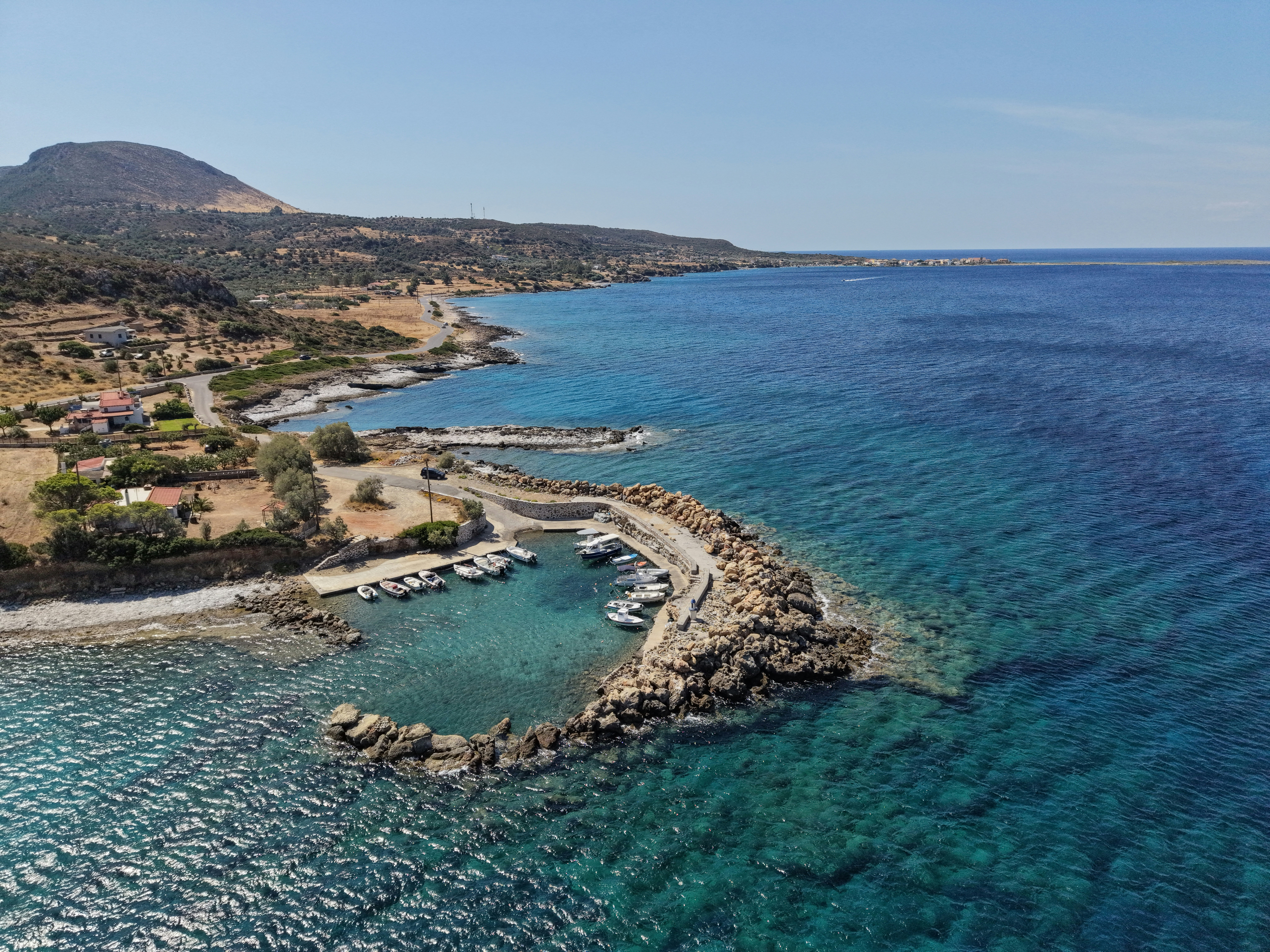 Harbor Cins: A Quiet Cove Framed by Blue Expanse