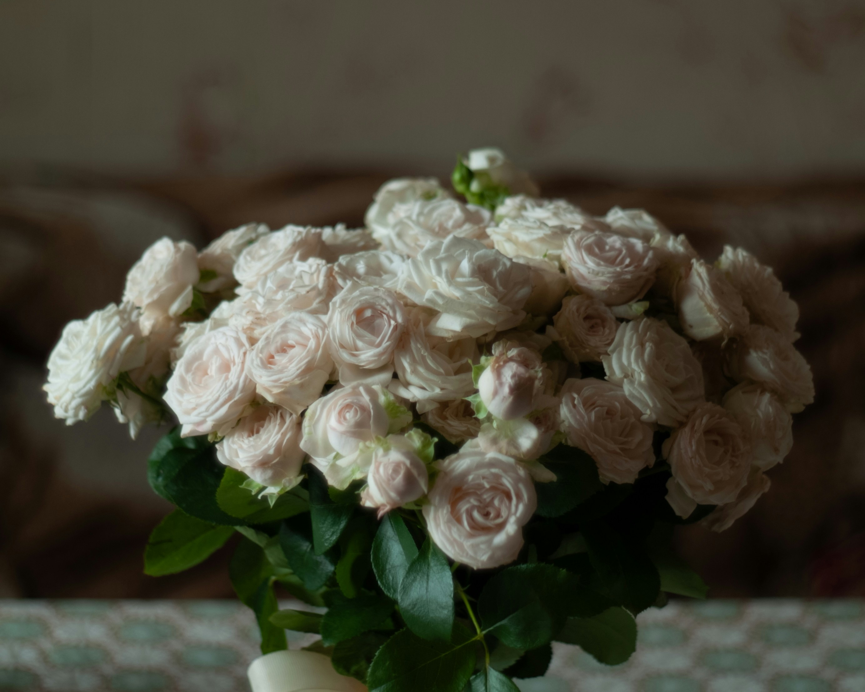 Softly Petaled Promise: A Bouquet of Pale Roses