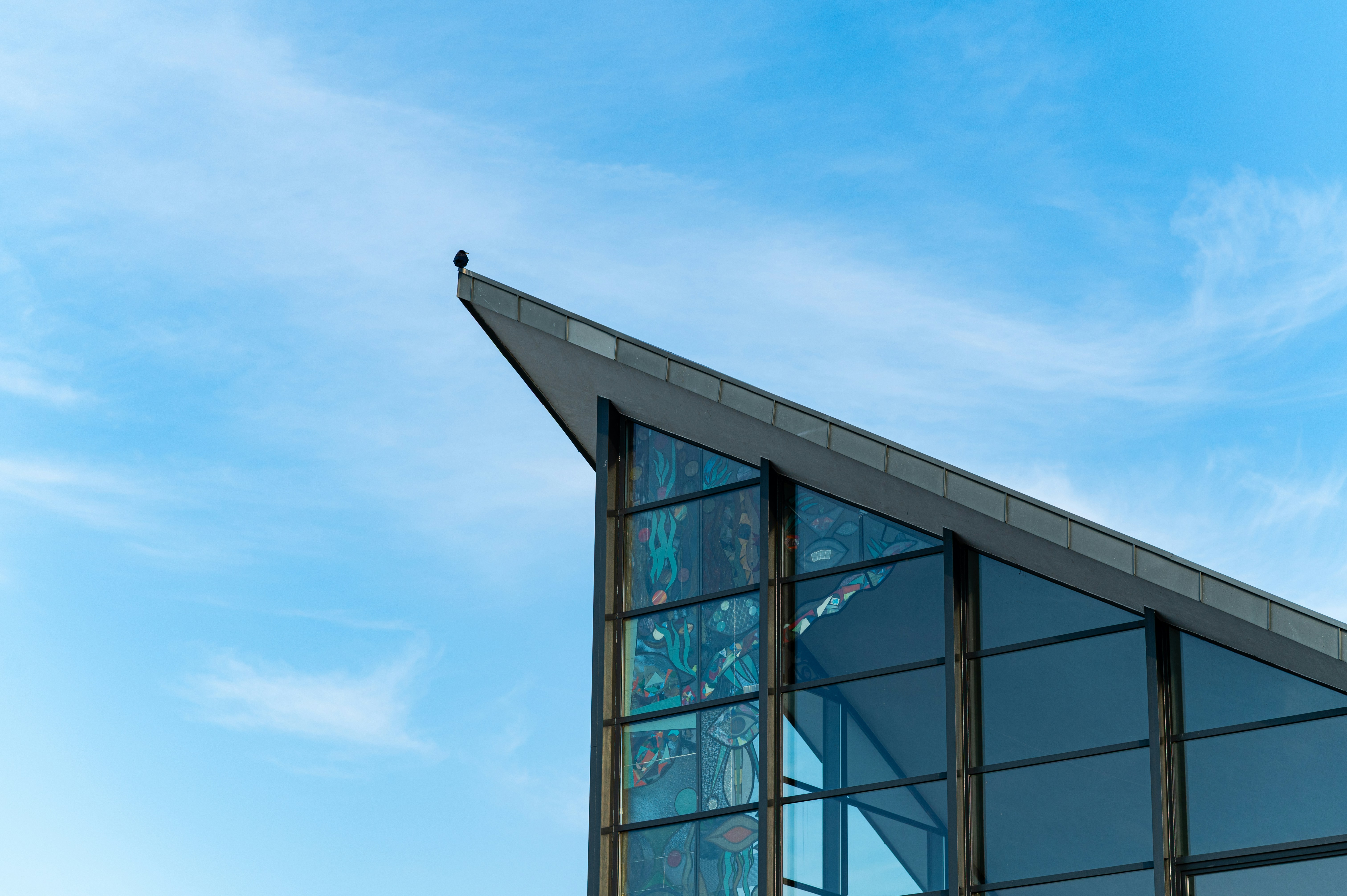 Angular Glass facade under a Resolved Blue Sky