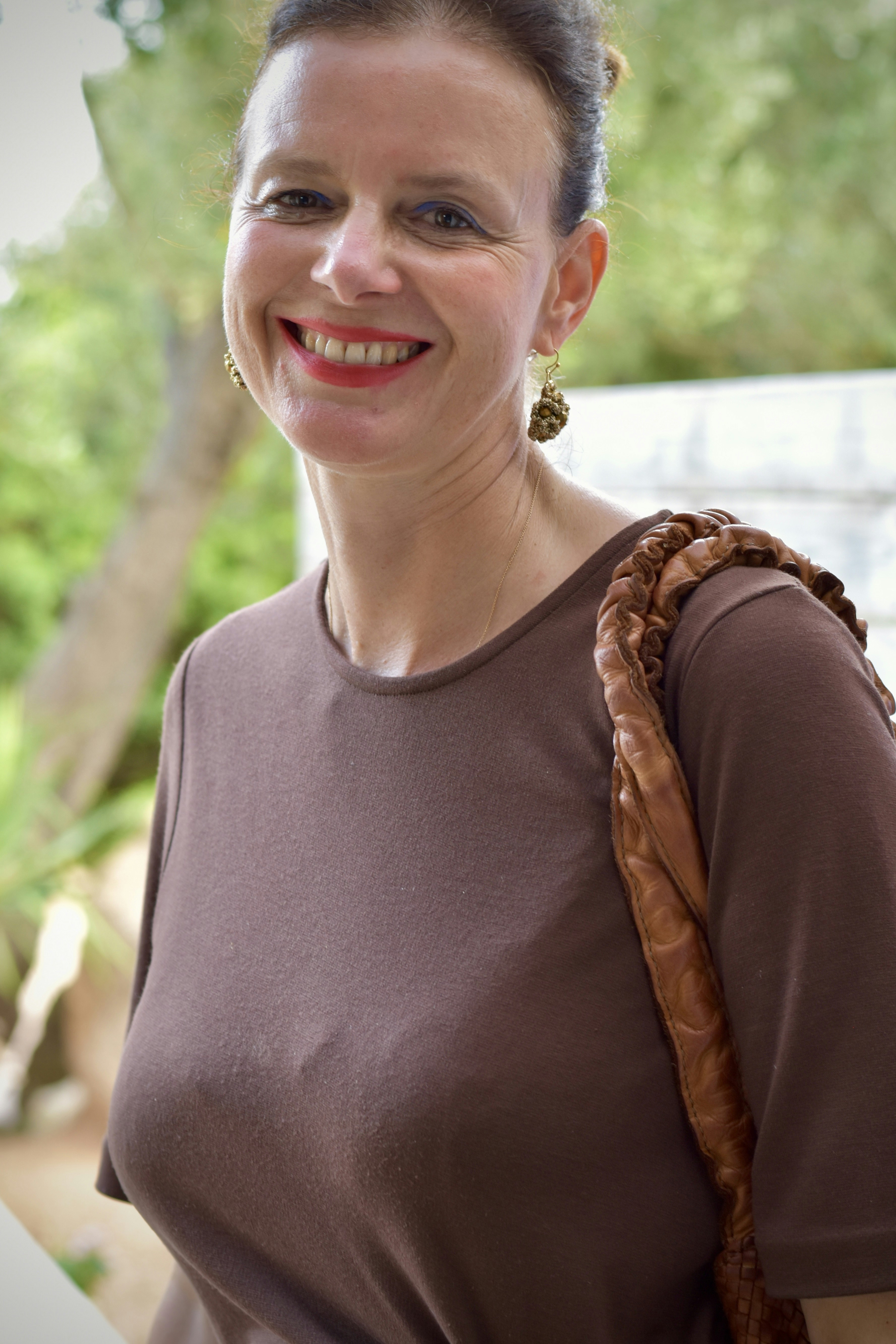 Bright Smiles and Brown Dress: Portrait in Soft Garden Light