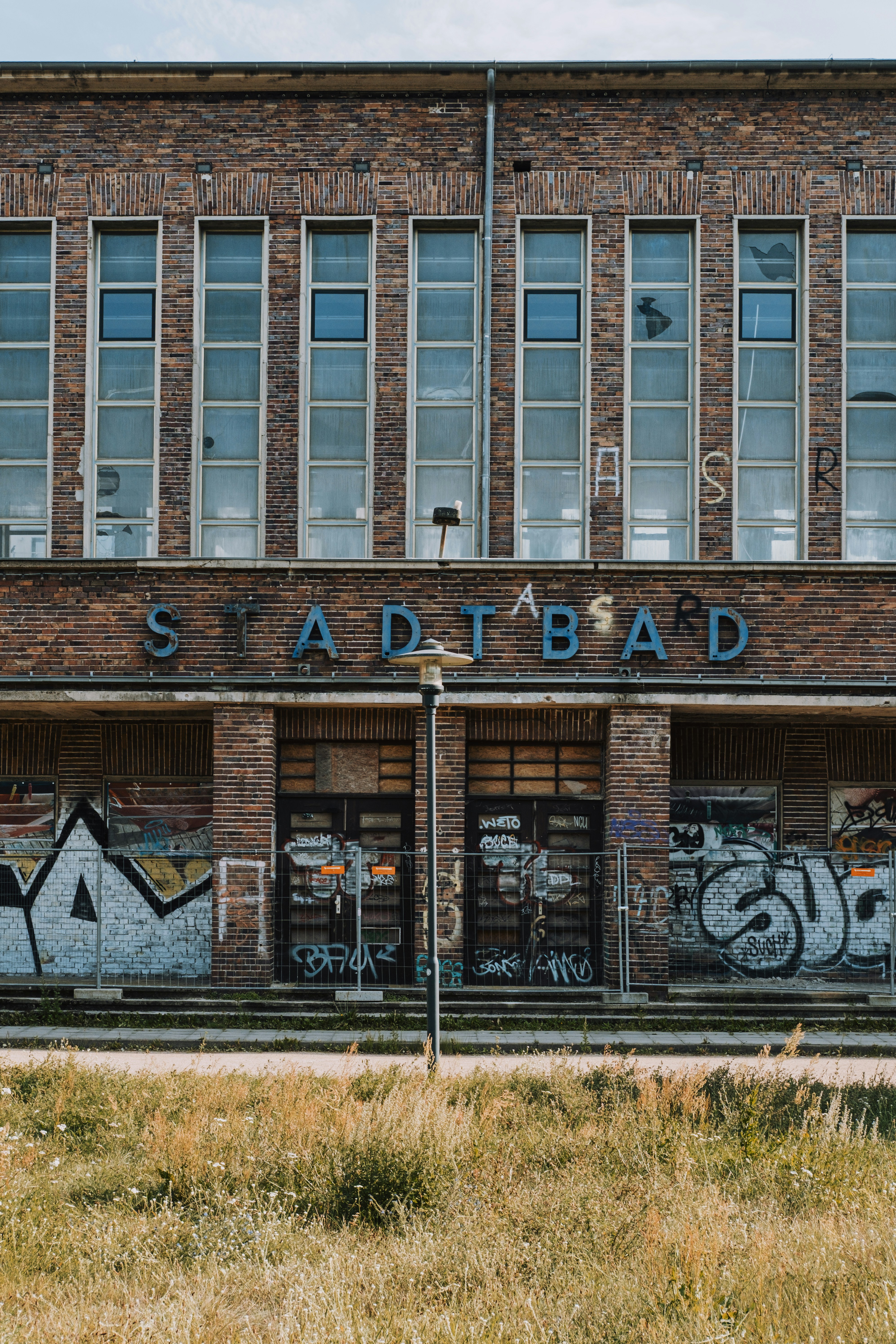 Abandoned Stationhouse: Graffiti, Brick, and Broken Windows