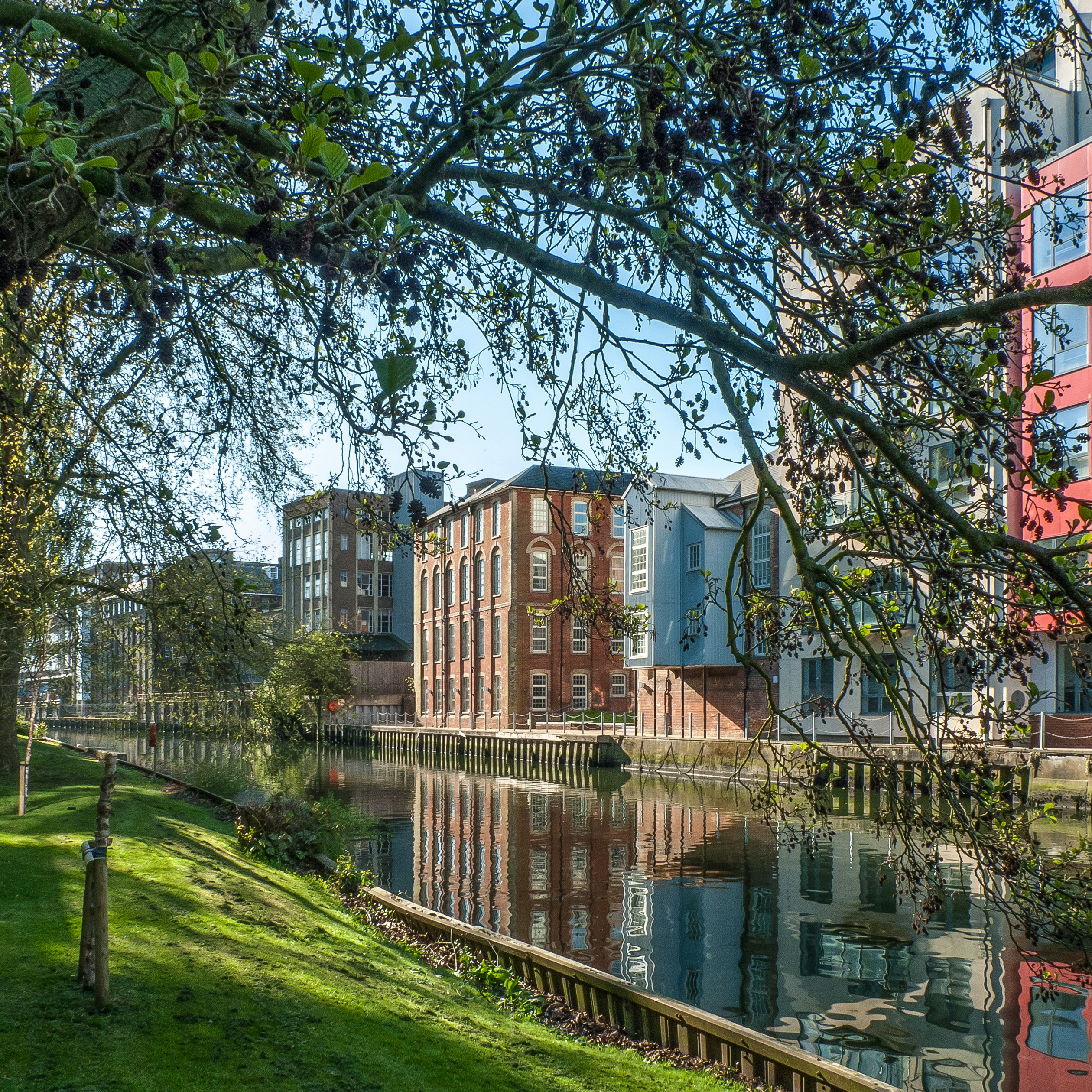 Canal-side Reflections: Brick Row beside the Water
