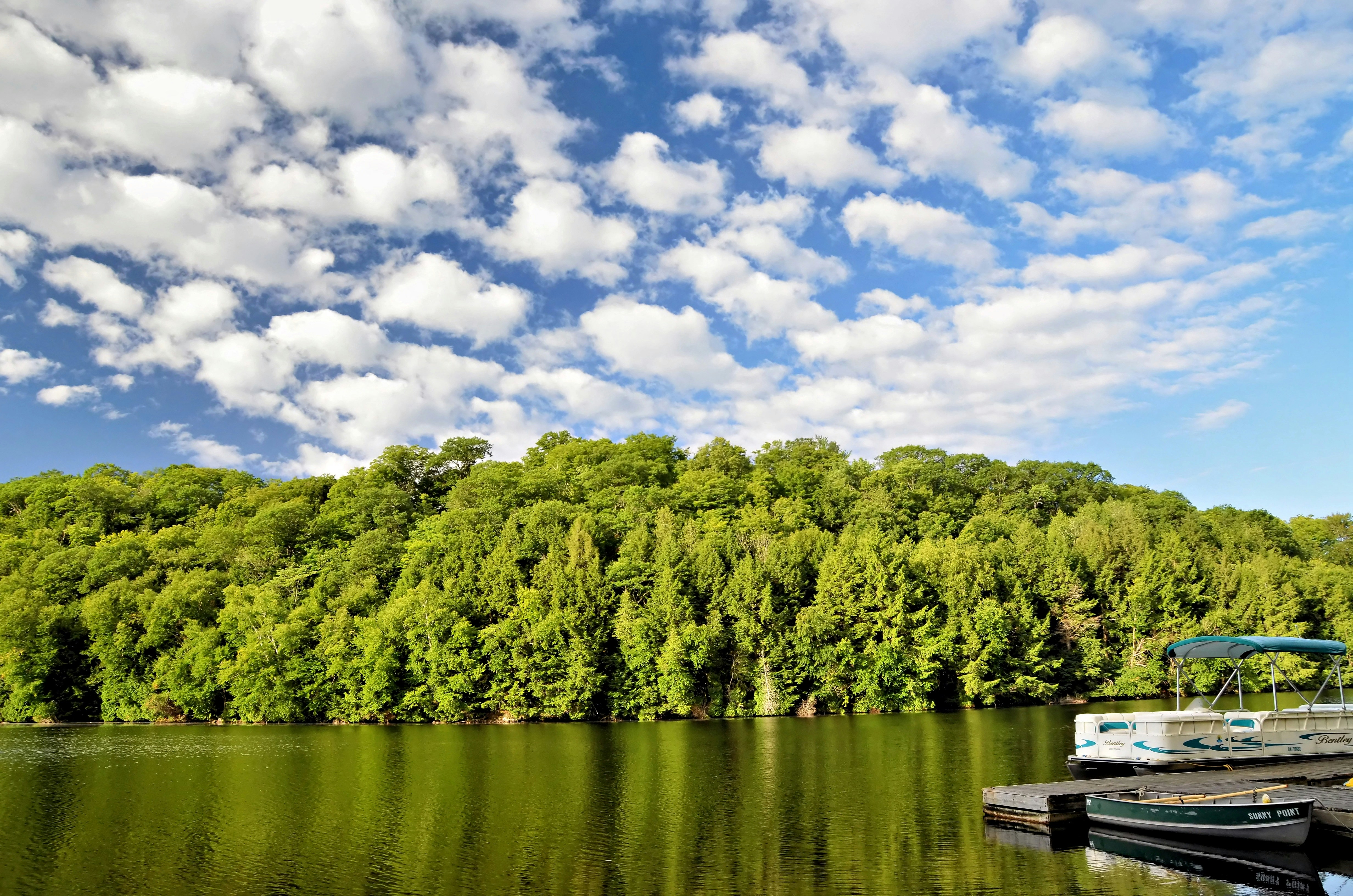 Lakeside Docks Beneath a Patchwork Sky