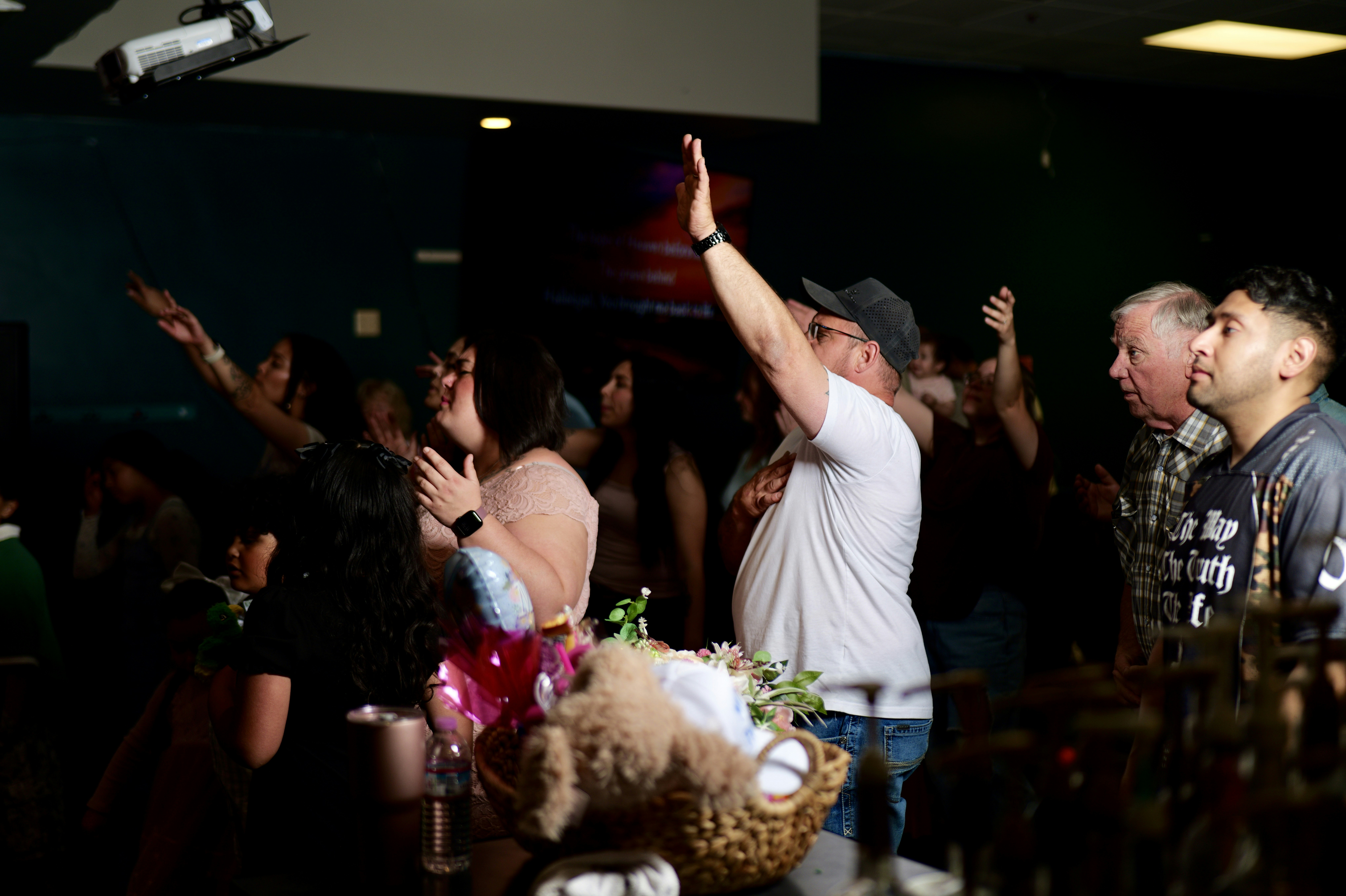 Raised Hands in a Lively Crowd Preserving a Moment of Shared Energy