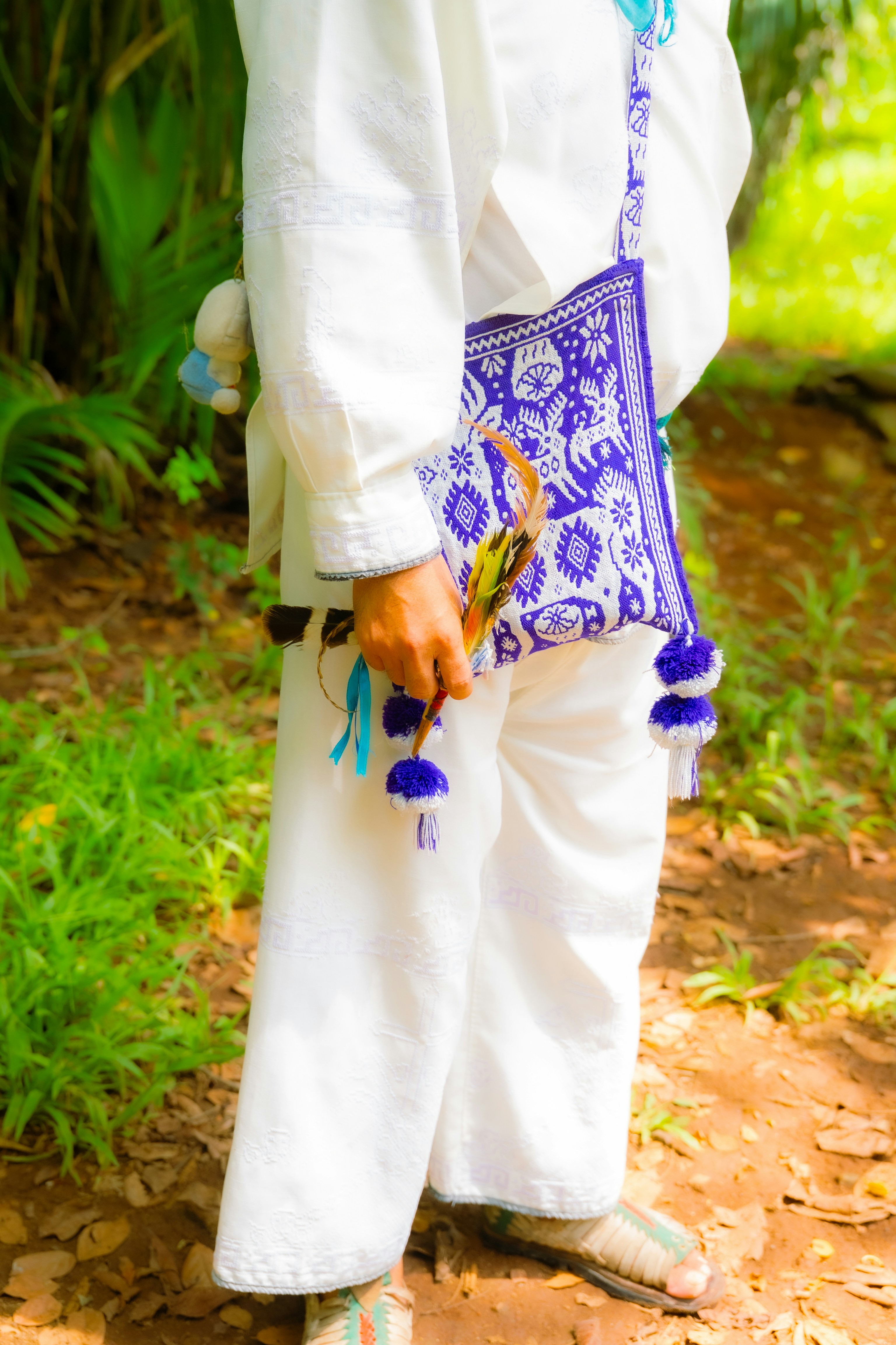 Echoes of Indigo: A Handheld Moment with a White Garment Traveler