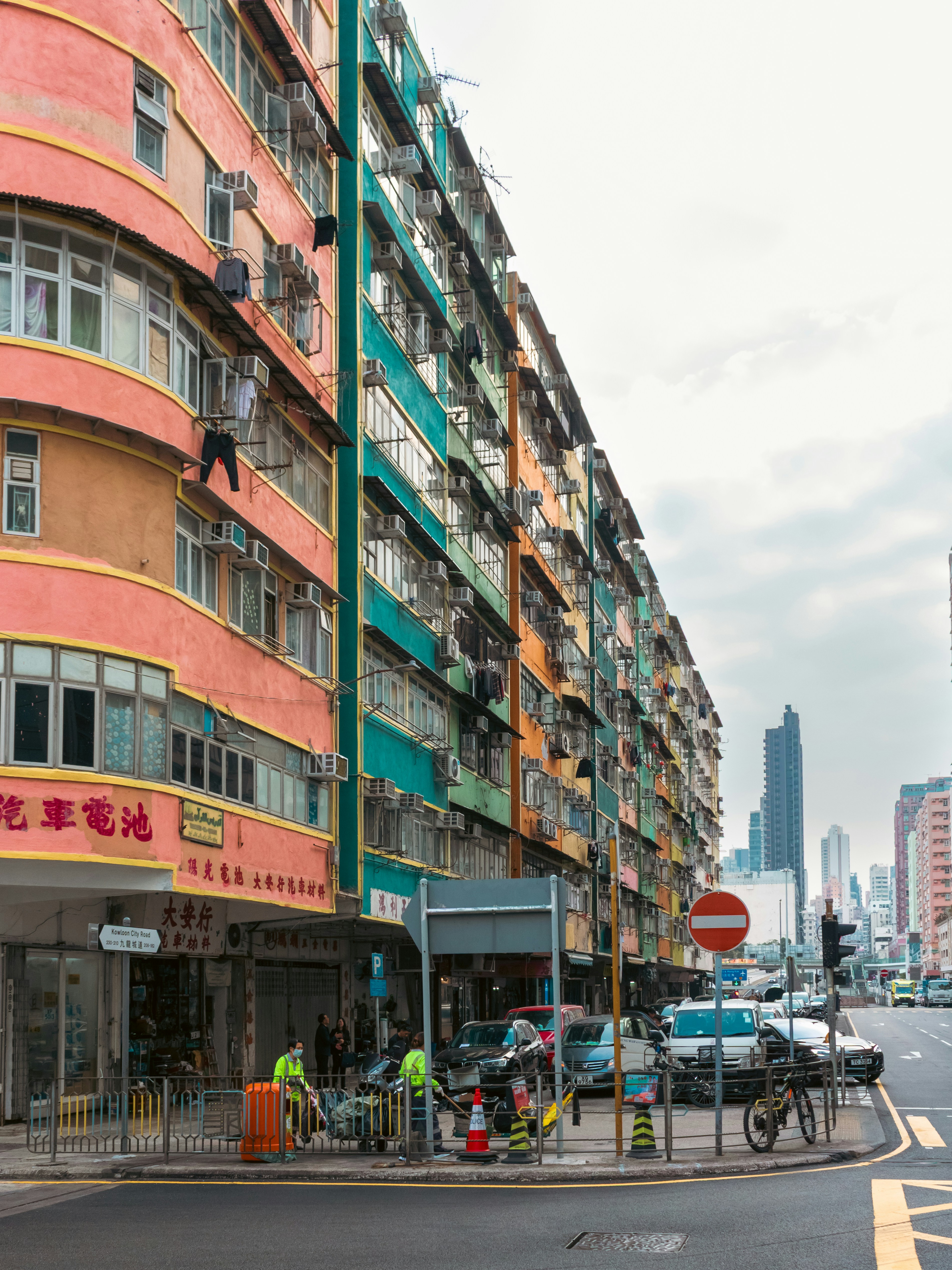 Colorful Urban Cascade: A Live Street Scene of Apartment Facades