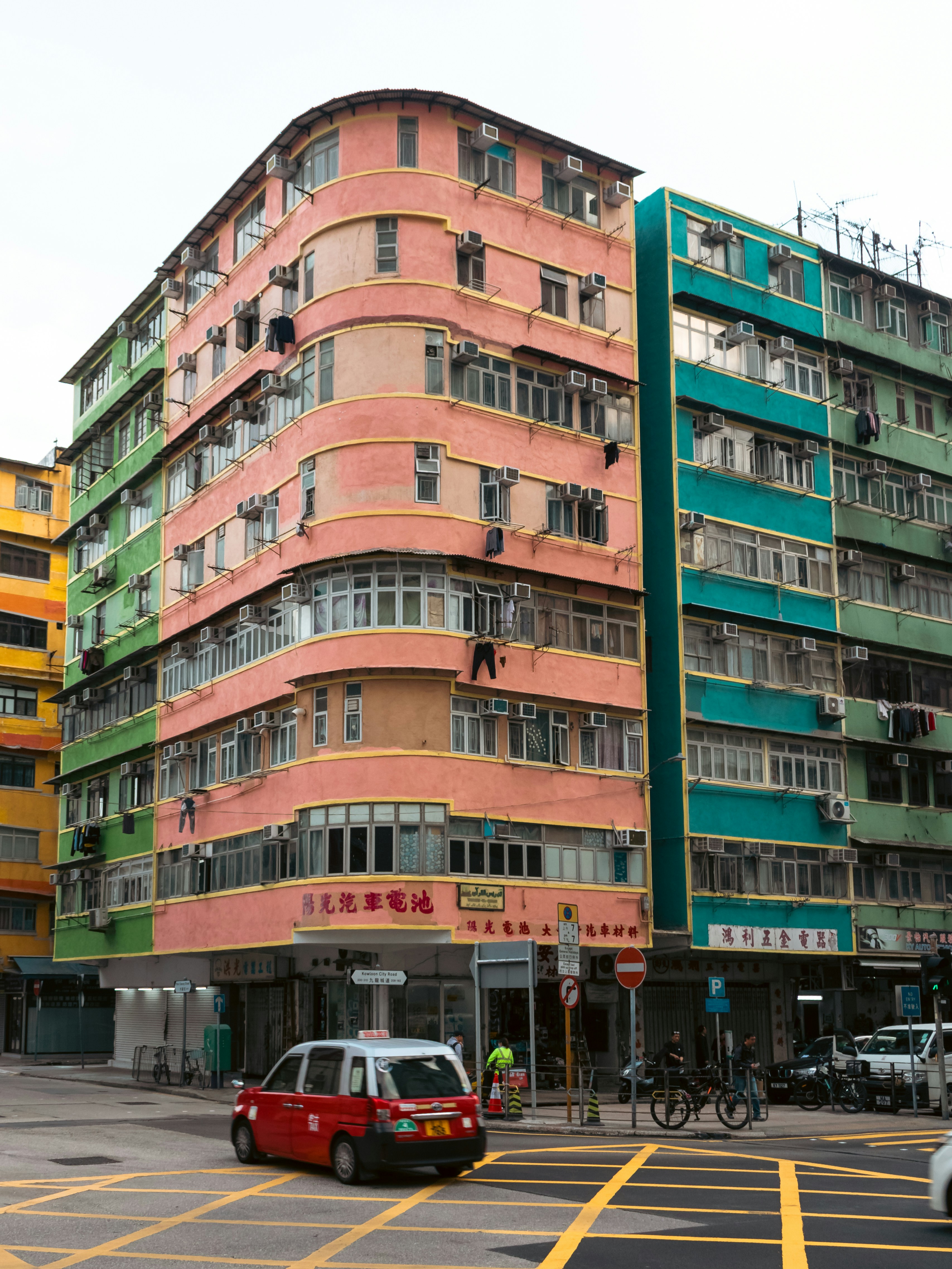 Chromatic Facade: A Tang of Balconies and Street Life