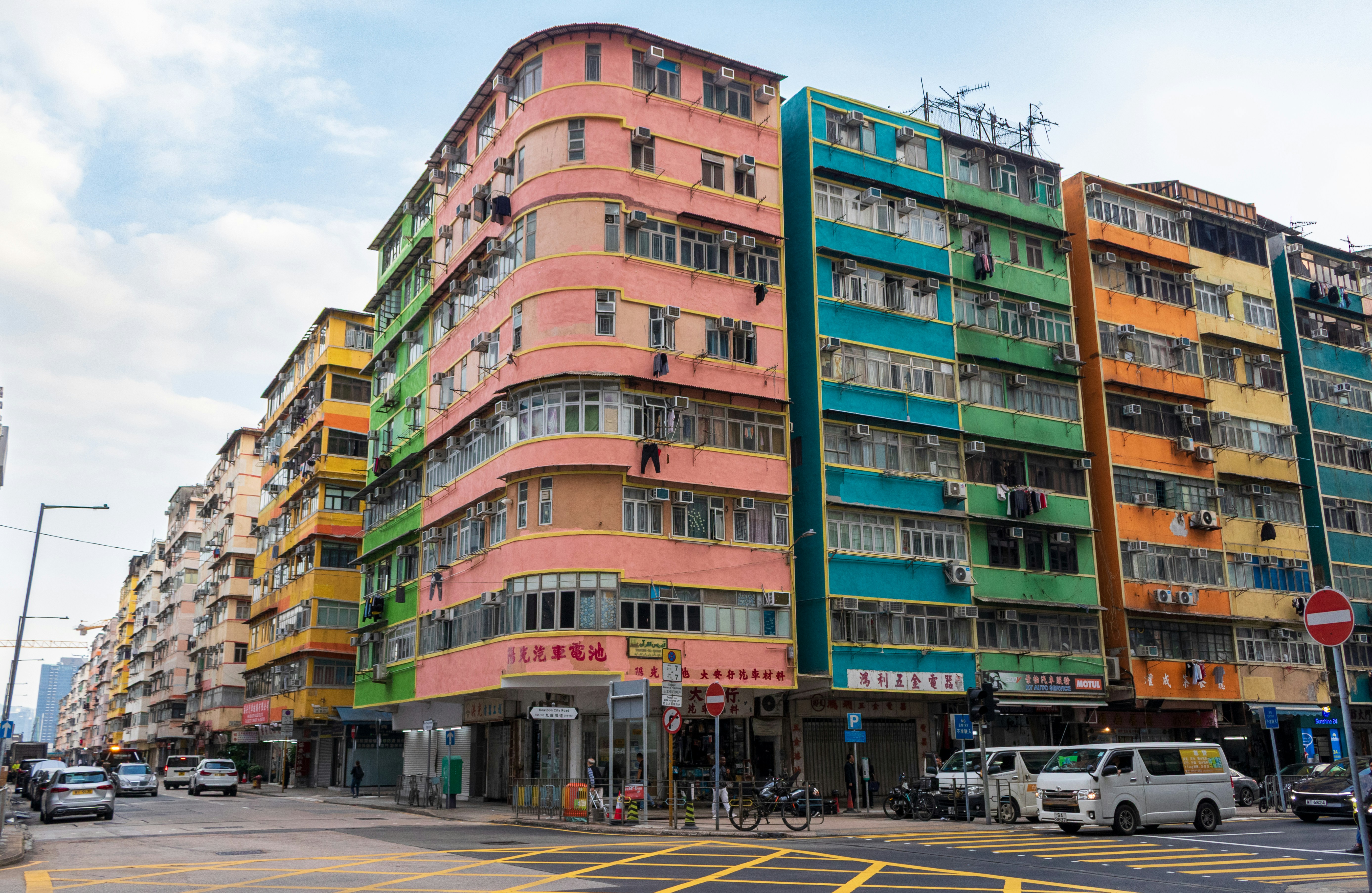 Rainbowed Corners: A Street of Colorful Balconies