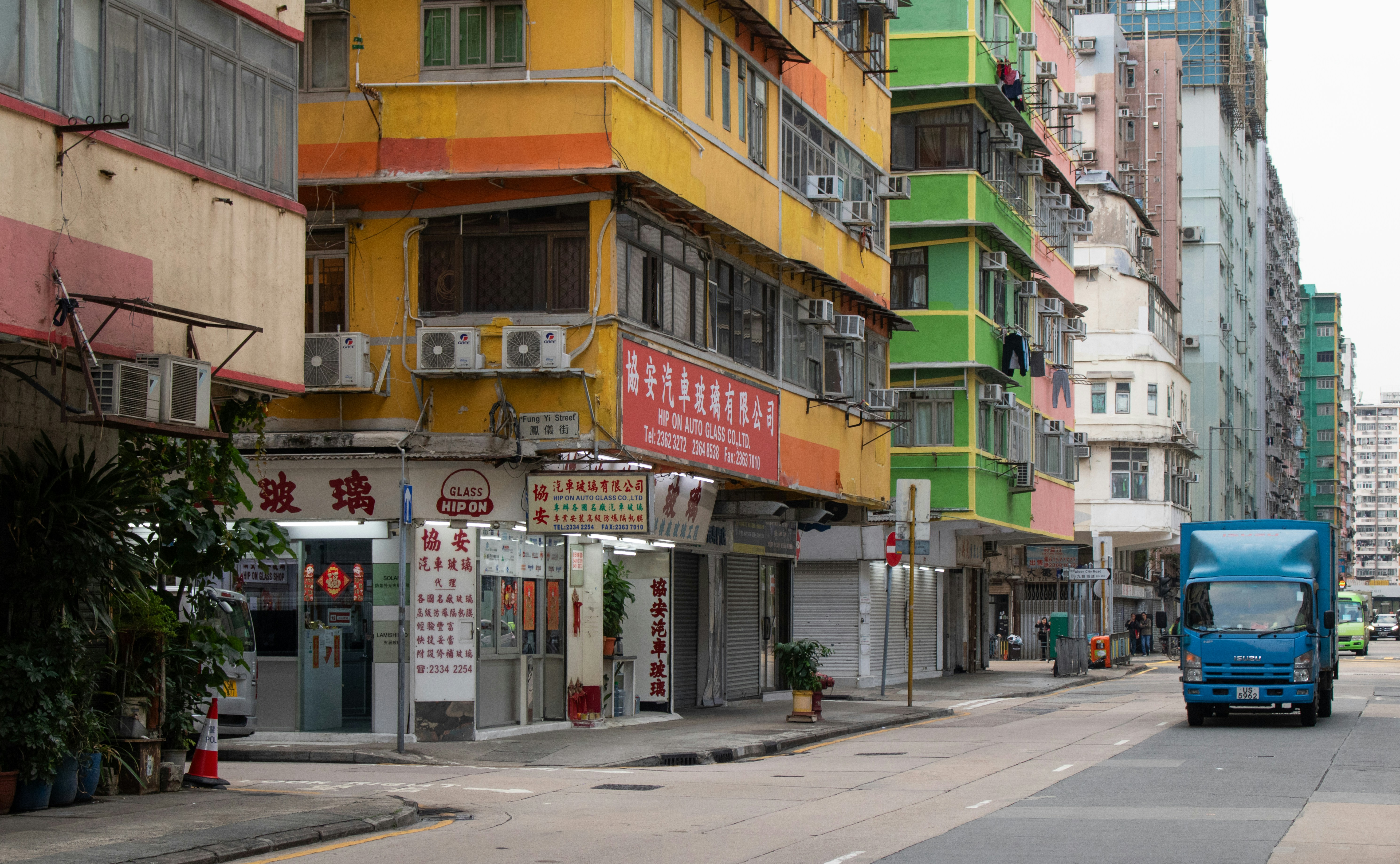 Colorful urban silhouette: stacked facades facing a quiet street