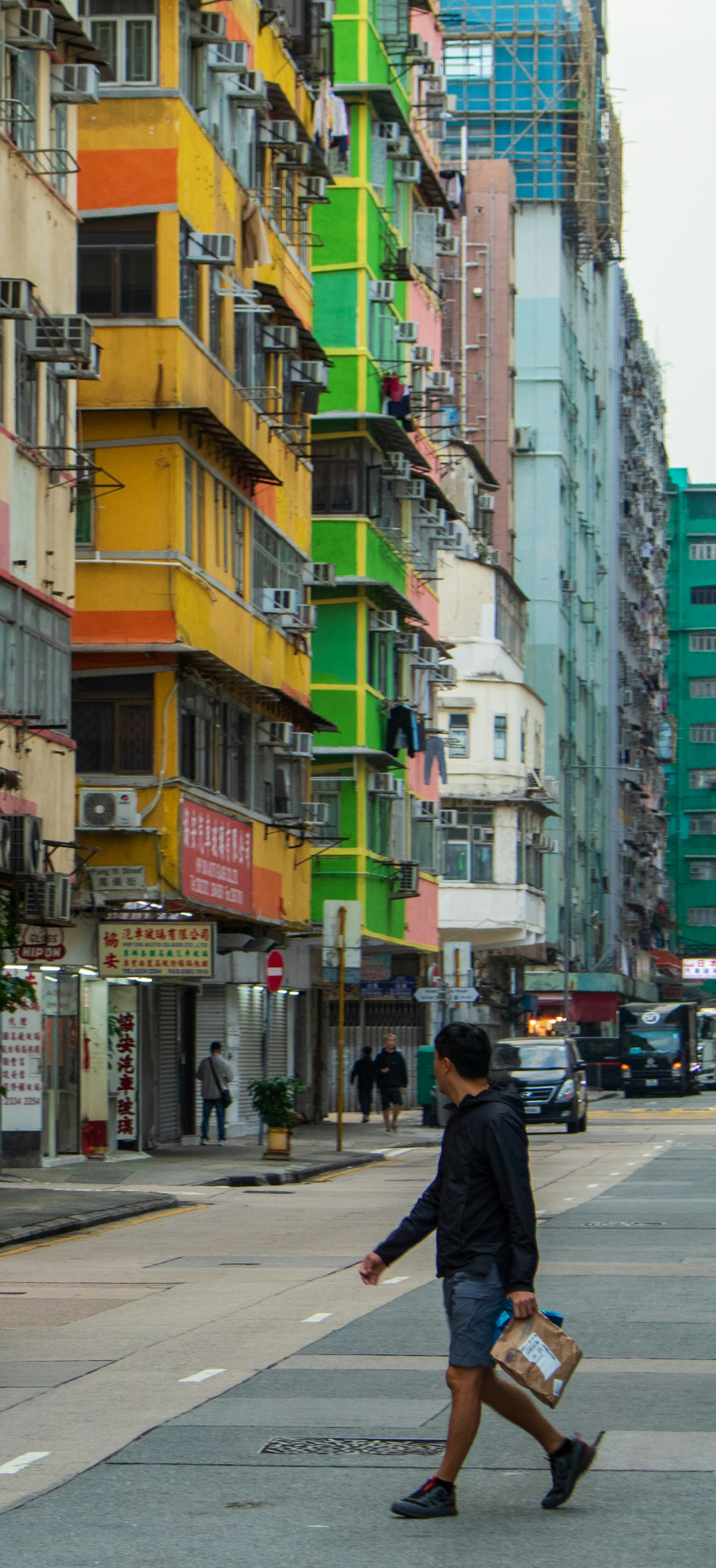 Colorful Facades and a City Walker: A Street Scene in Motion