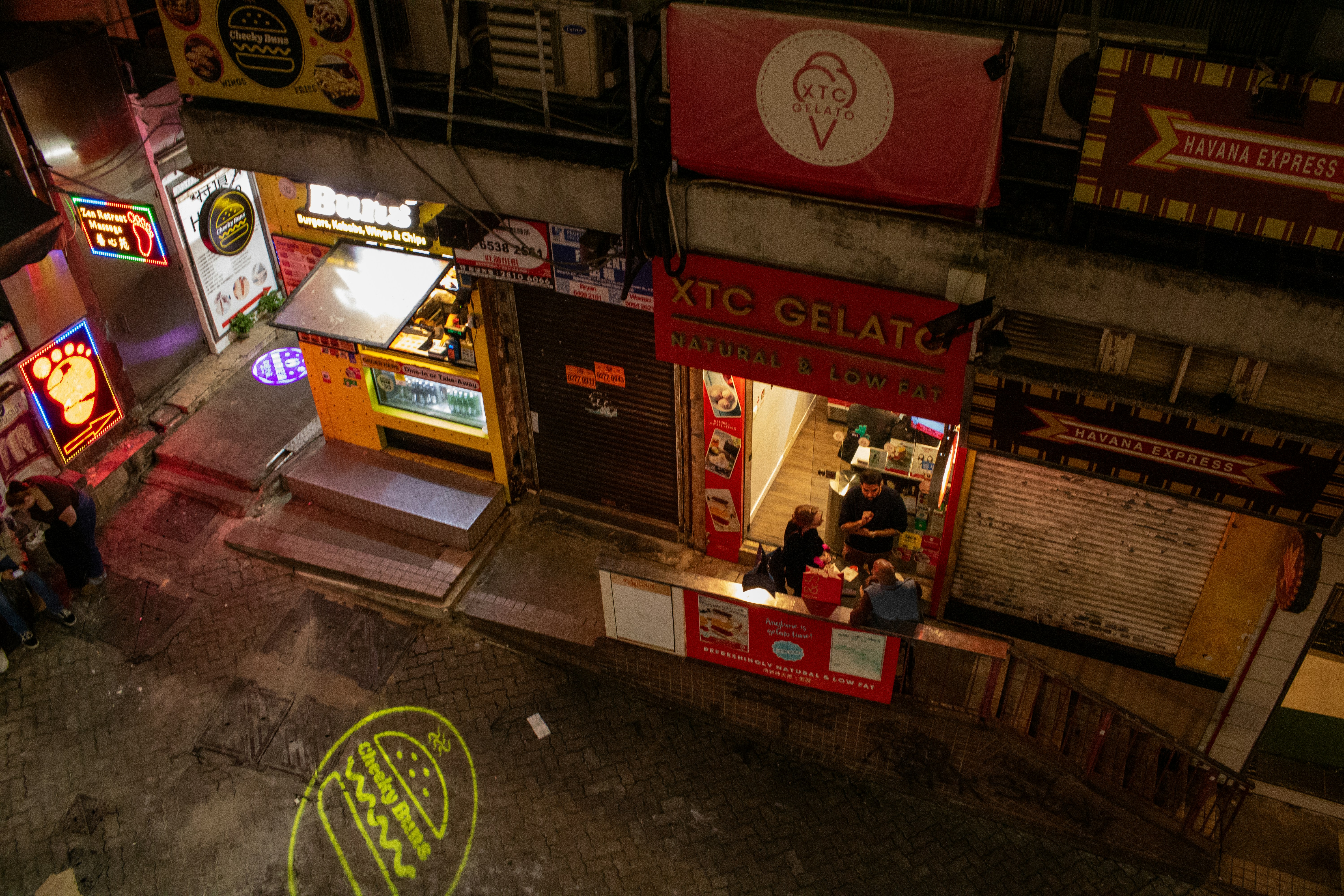 Neon Alleyway at Dusk: Signs and Shadows