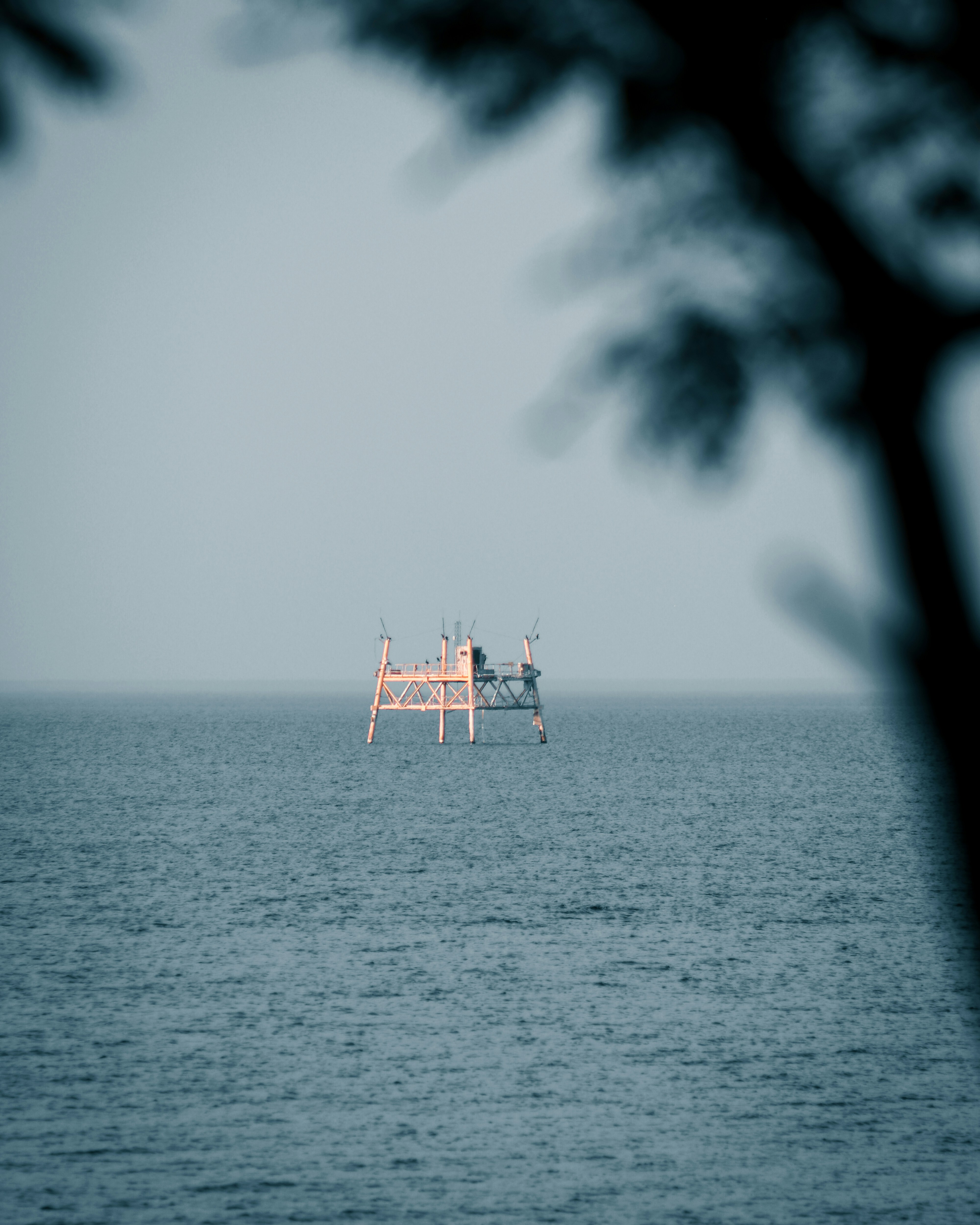 Lone Offshore Structure: A Quiet Moment Between Sea and Sky