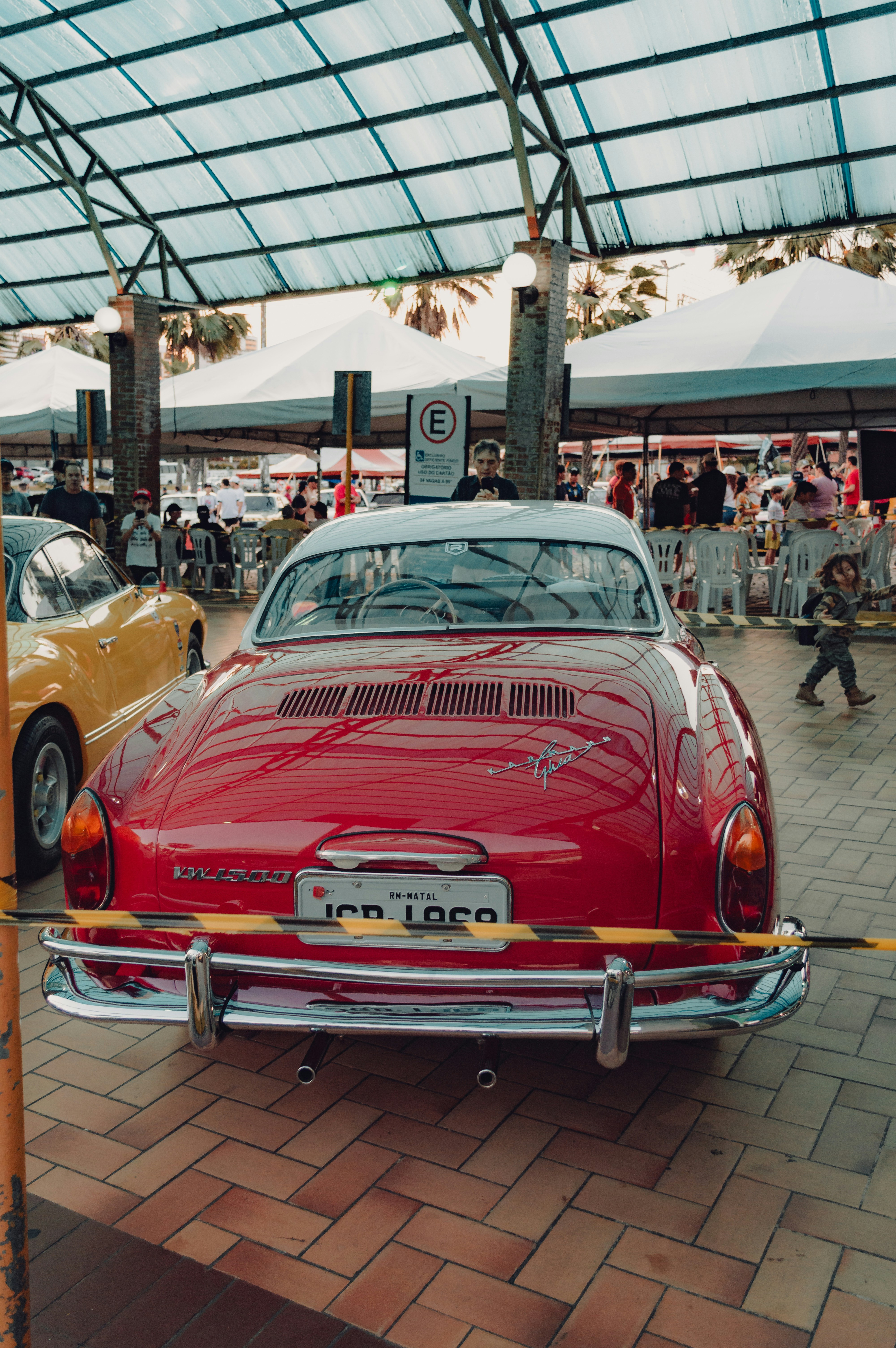 Red Classic: The Heart of a Car Show Crowd