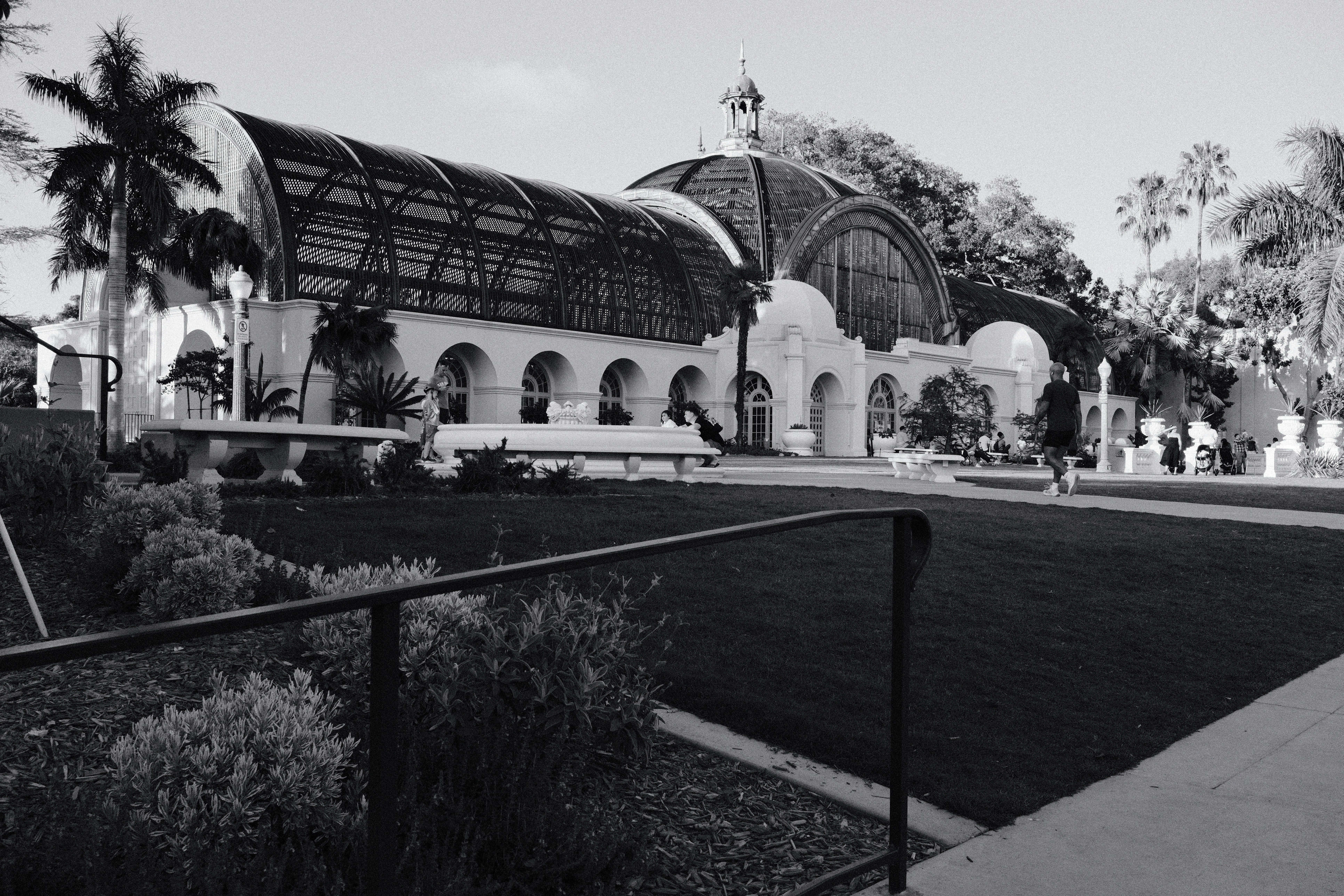 Glasshouse Arc at Dusk: A Monochrome Pavilion