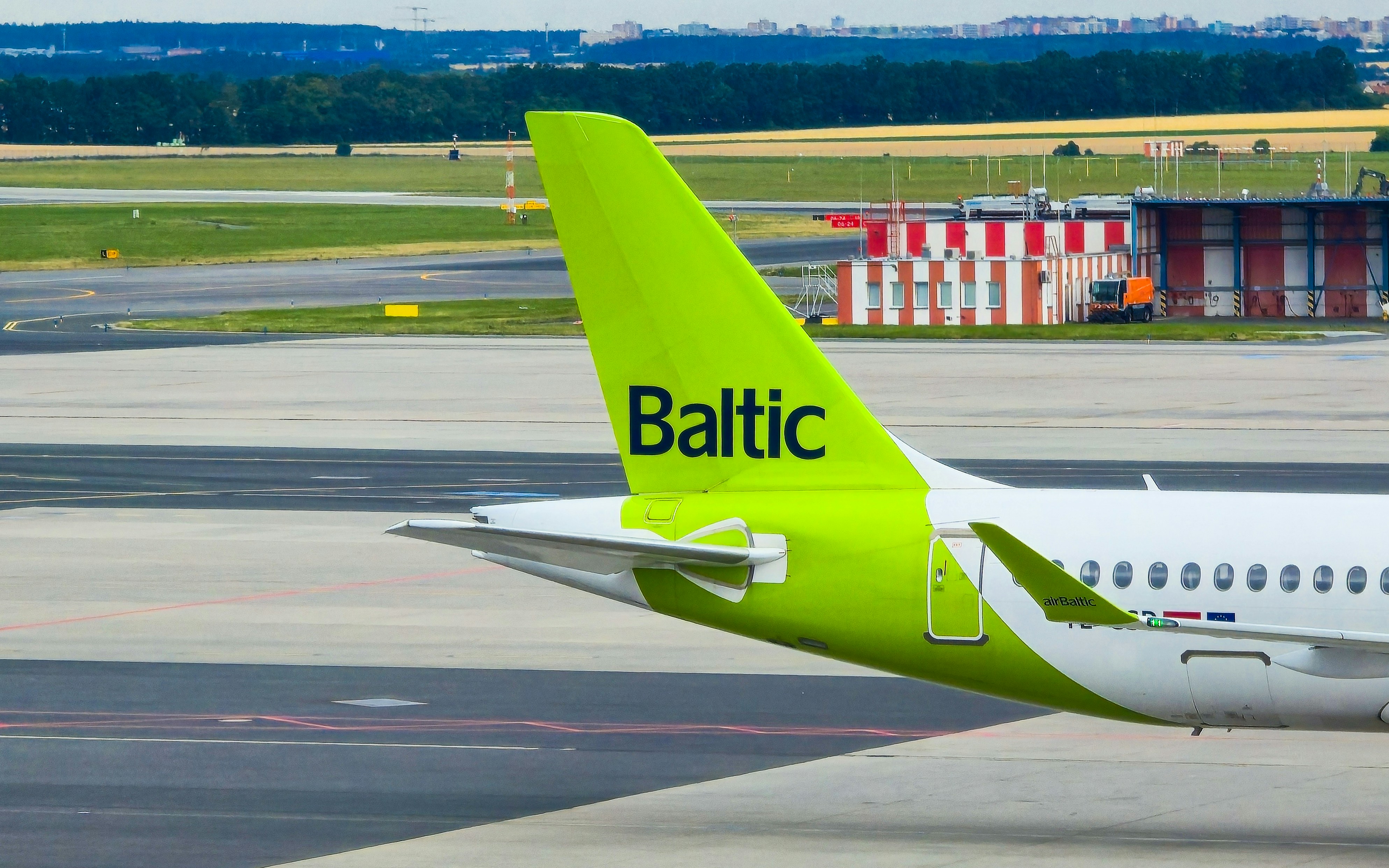 Lime-tail Itinerary: Baltic's Bold Wing at the Tarmac