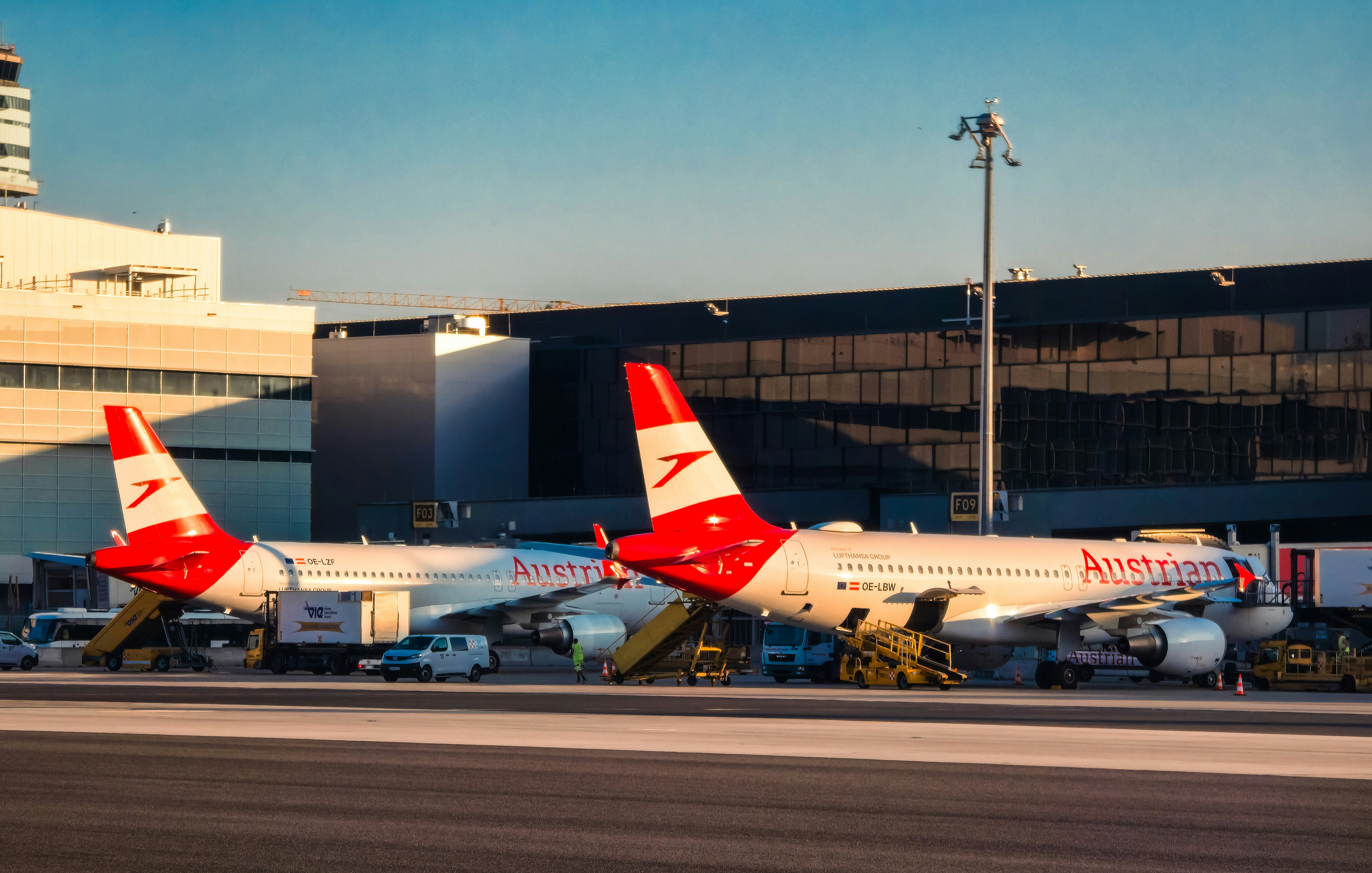 Twin Austrian Express: Grounded by Jets at Sunset