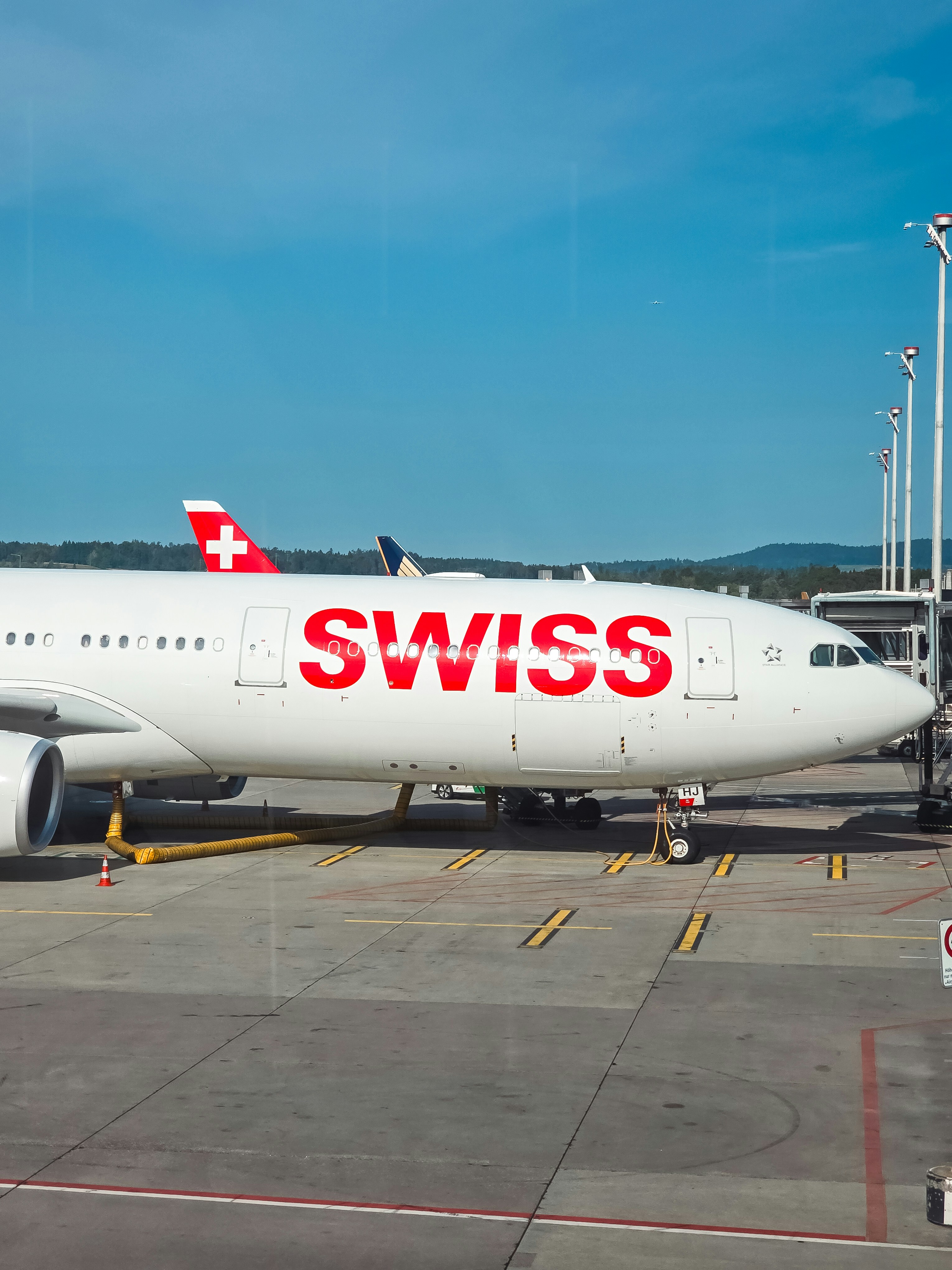 Swiss Air at Gate: Bold letters, Quiet Tarmac