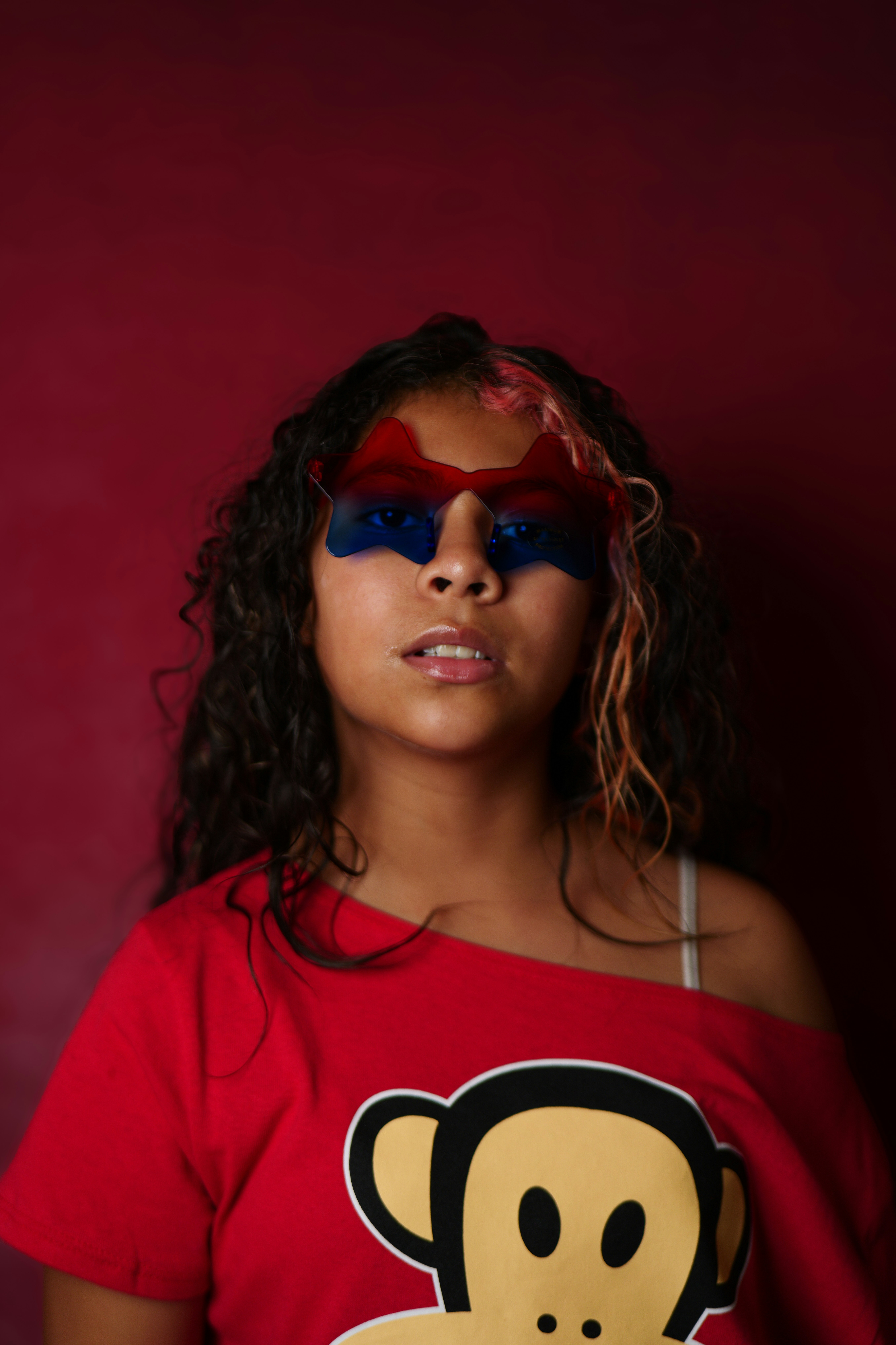 Glow in Red: The Masked Muse in Soft Focus