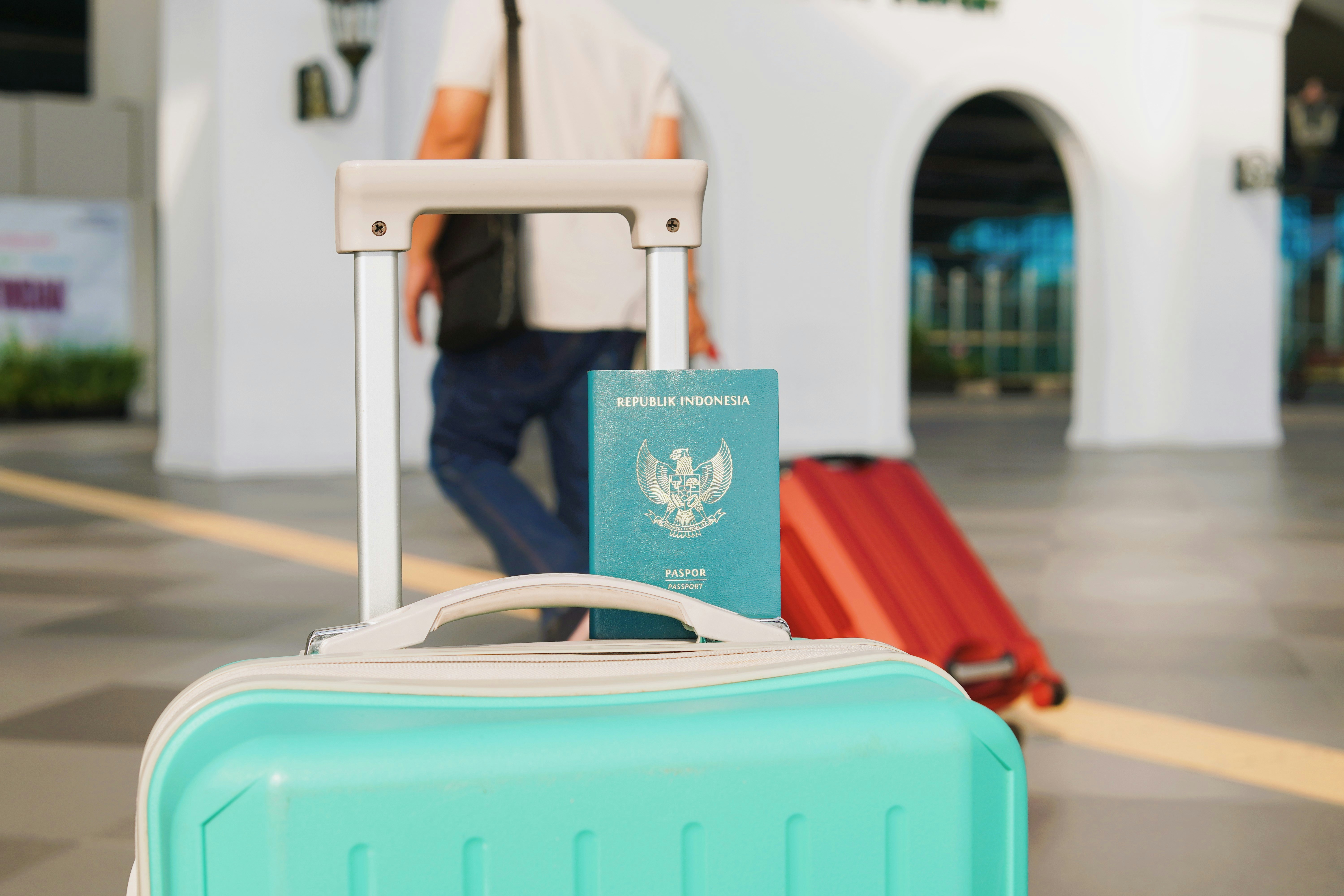 Minty Luggage at the Gate: Passport Ready in a Busy Terminal