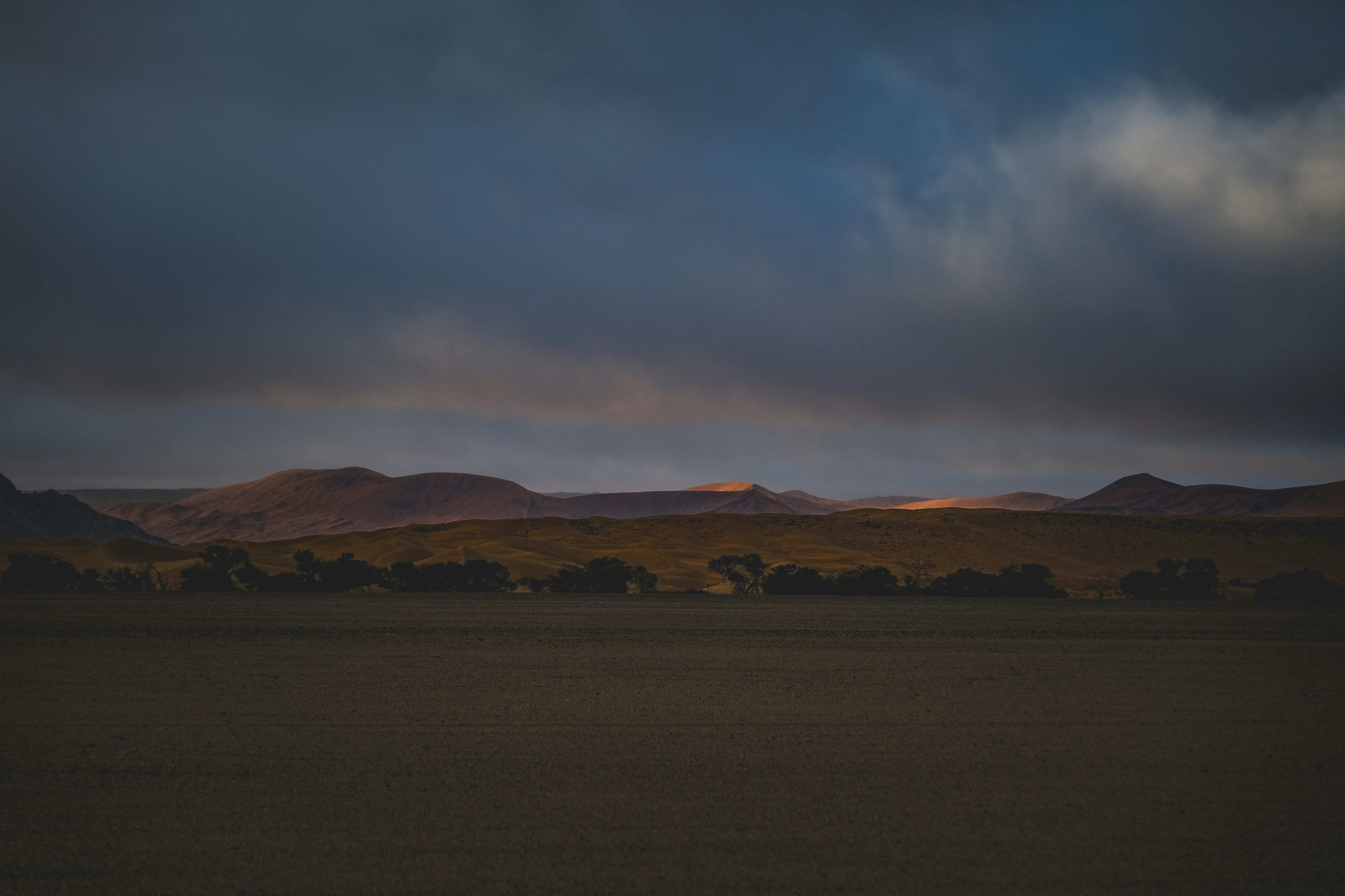 Dawn Over the Rolling Moor: A Quiet Ribbon of Light
