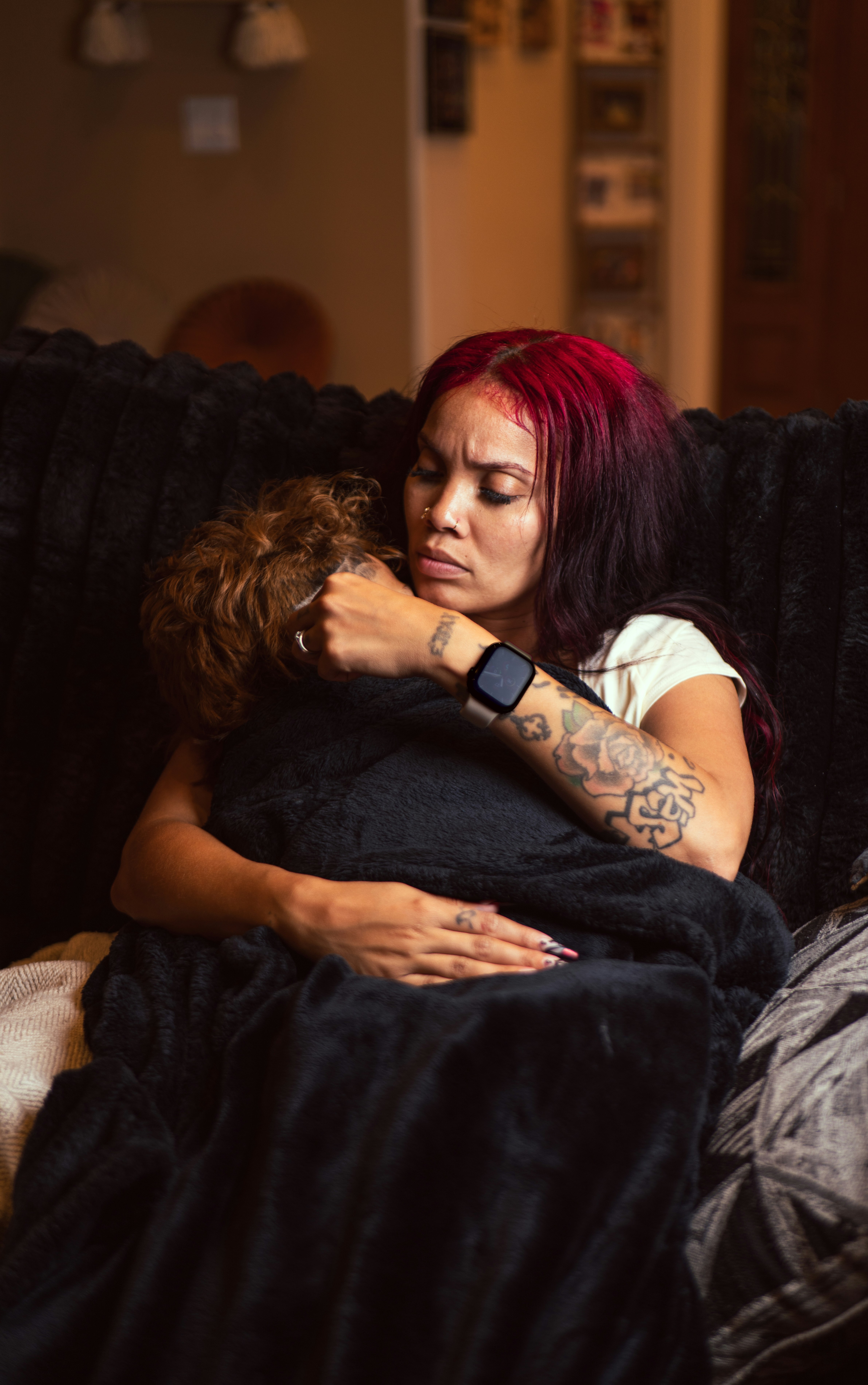 Close embrace in a dim living room
