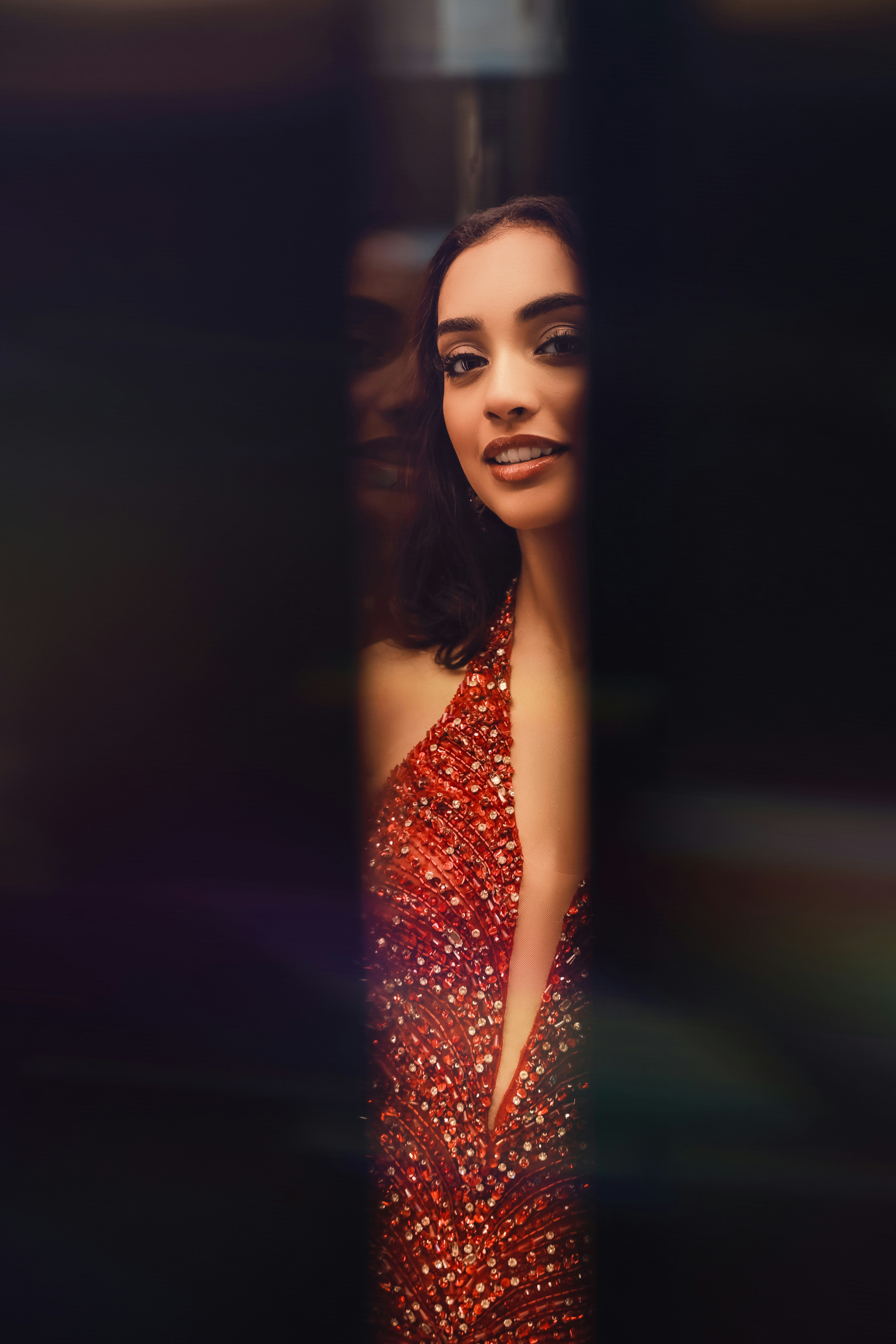 Veiled Glimmer: A Portrait Through Slivers of Light