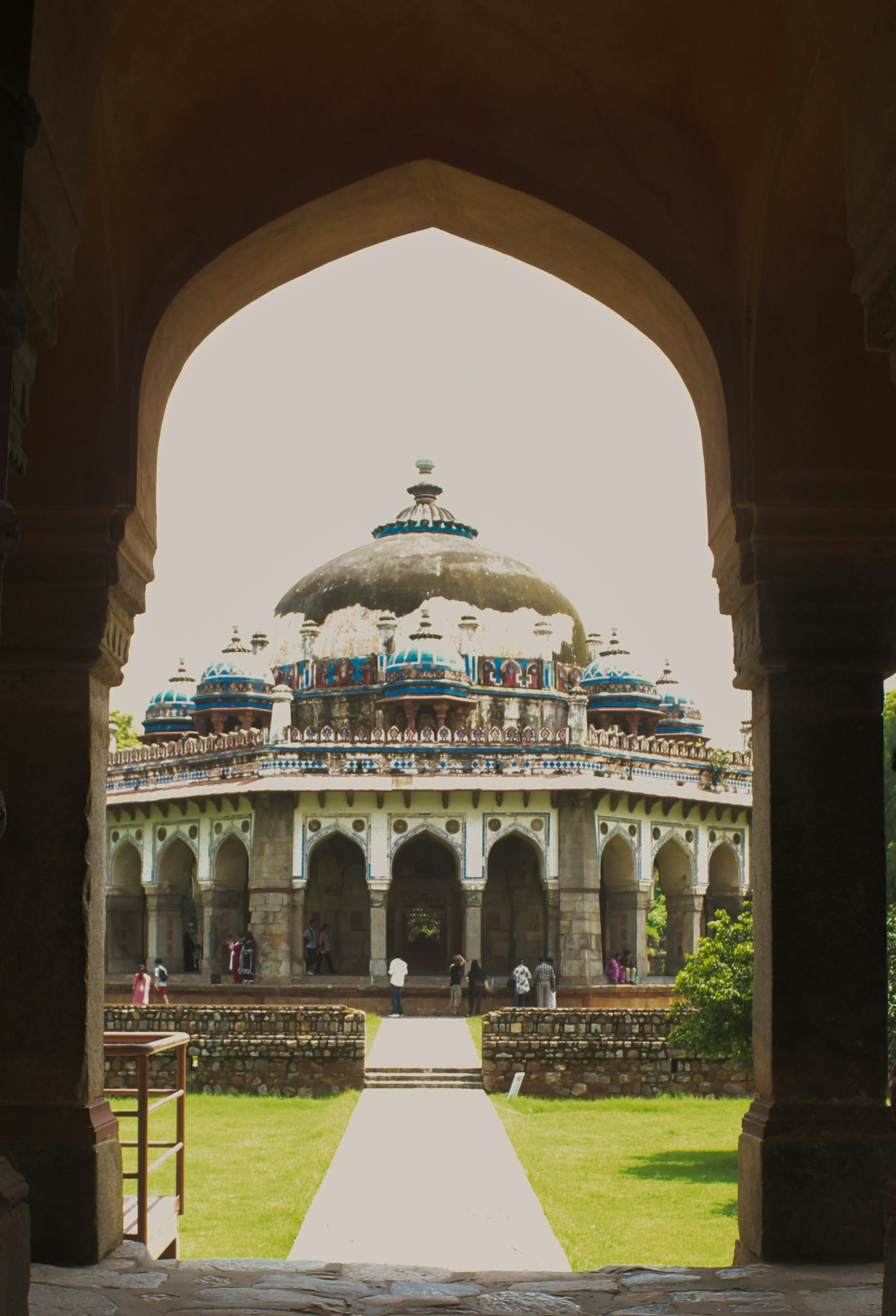 Courtyard Archway Framing a Dome: A Heritage Complex
