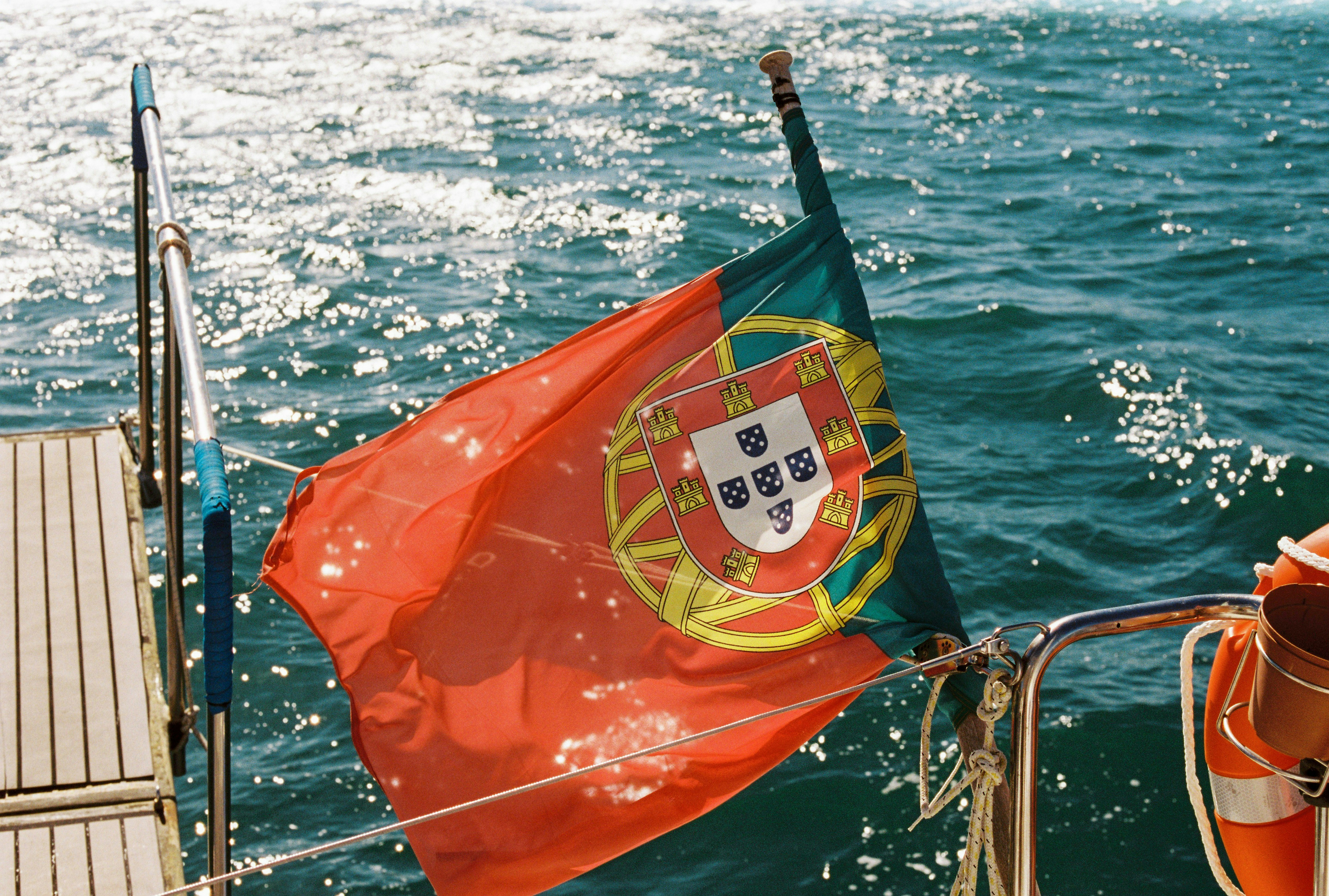 Flag of Portugal Basking in Sea Light on a Sail Deck