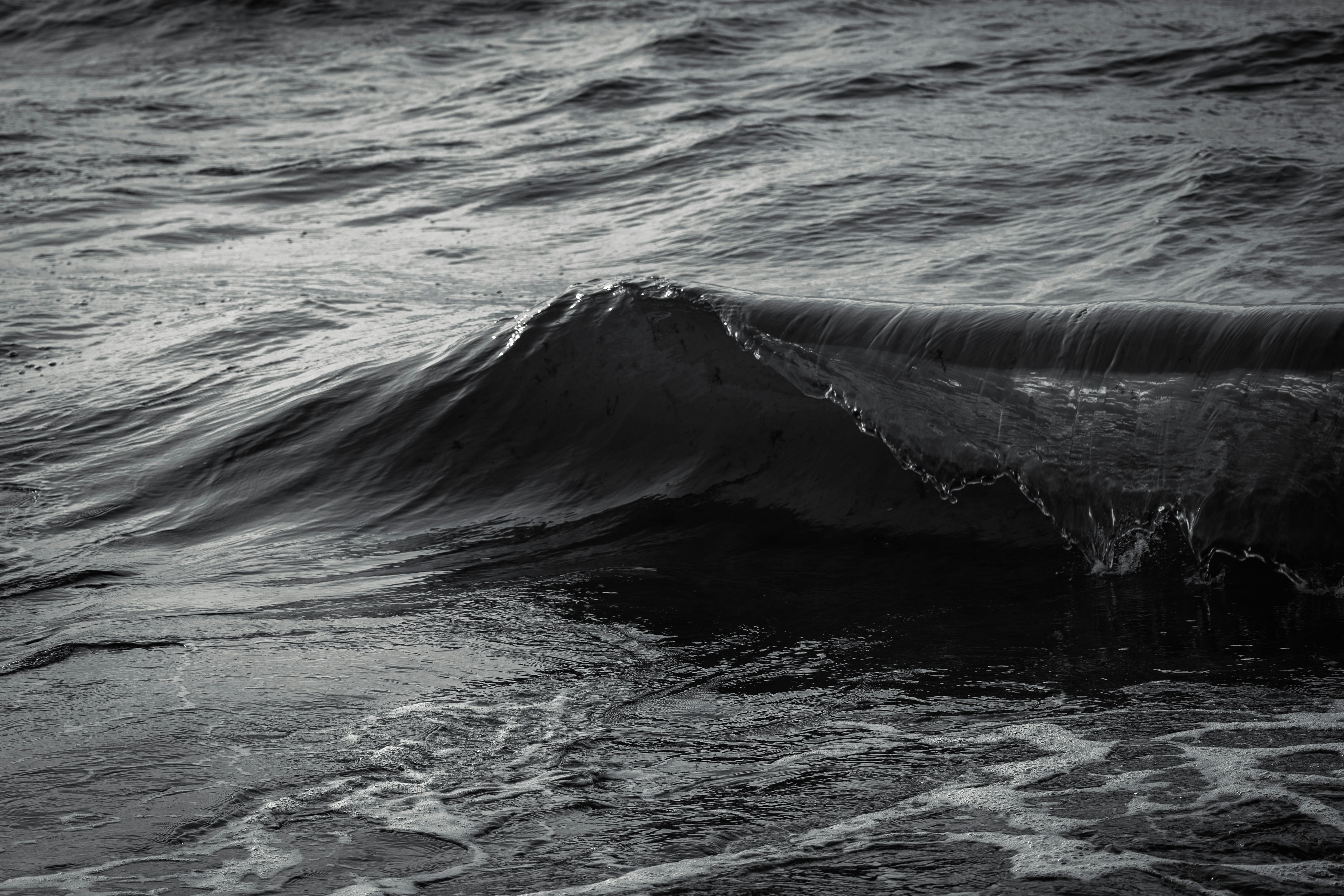 Moonlit Break: A Quiet Crest on a Monochrome Sea