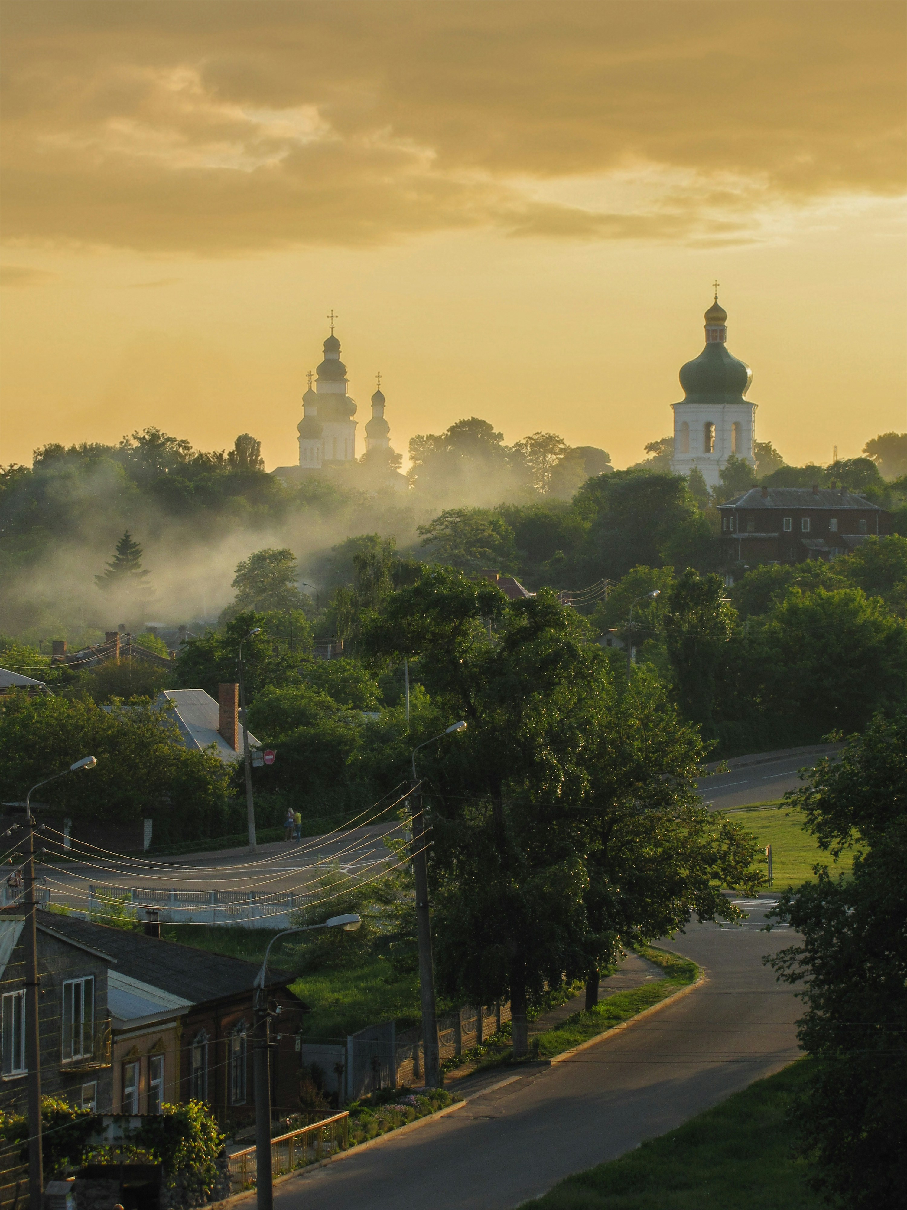 Rising Morning Silence Over a Town with Domed Bell Towers