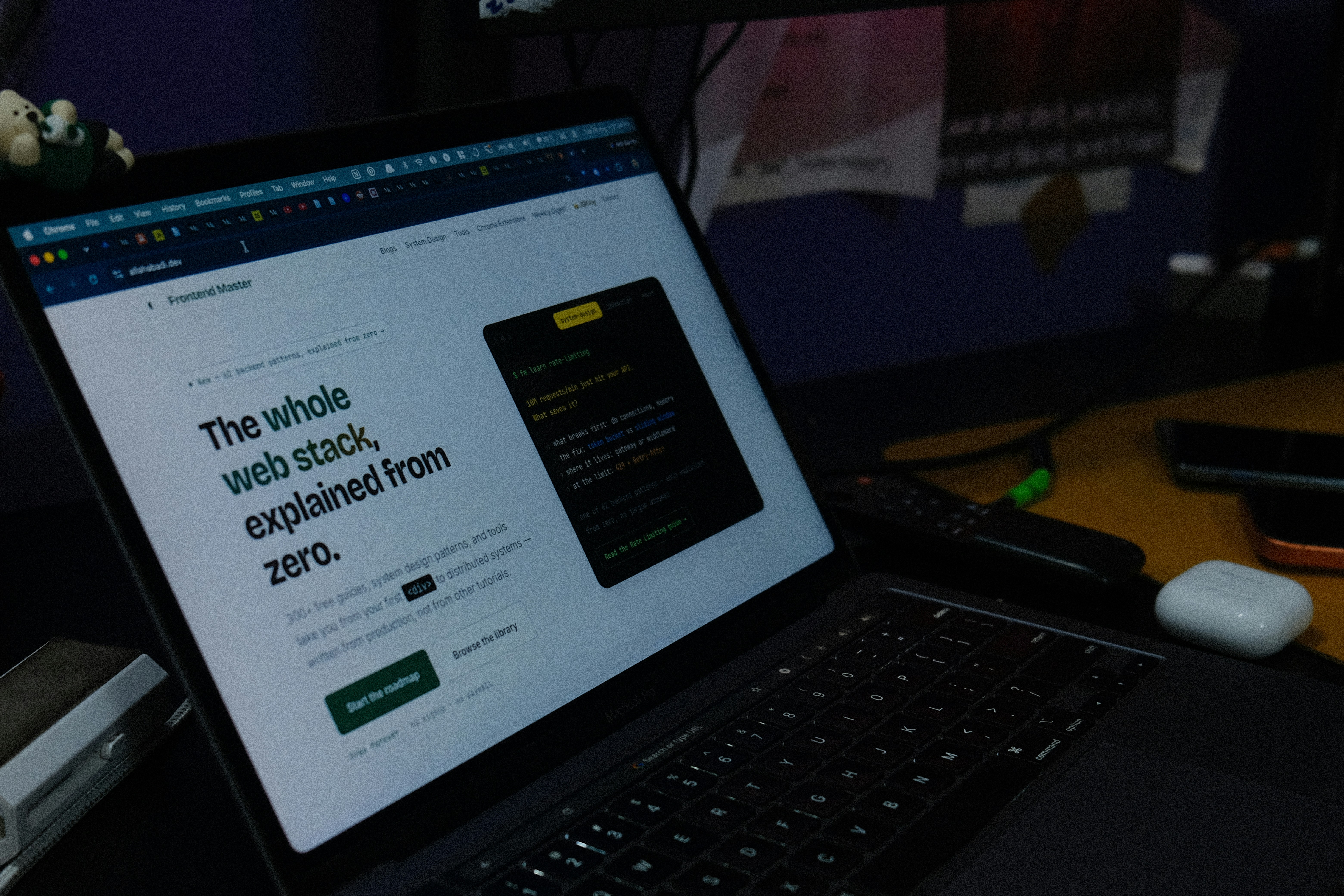Code on Glass: A Laptop Screen Illuminates a Quiet Desk