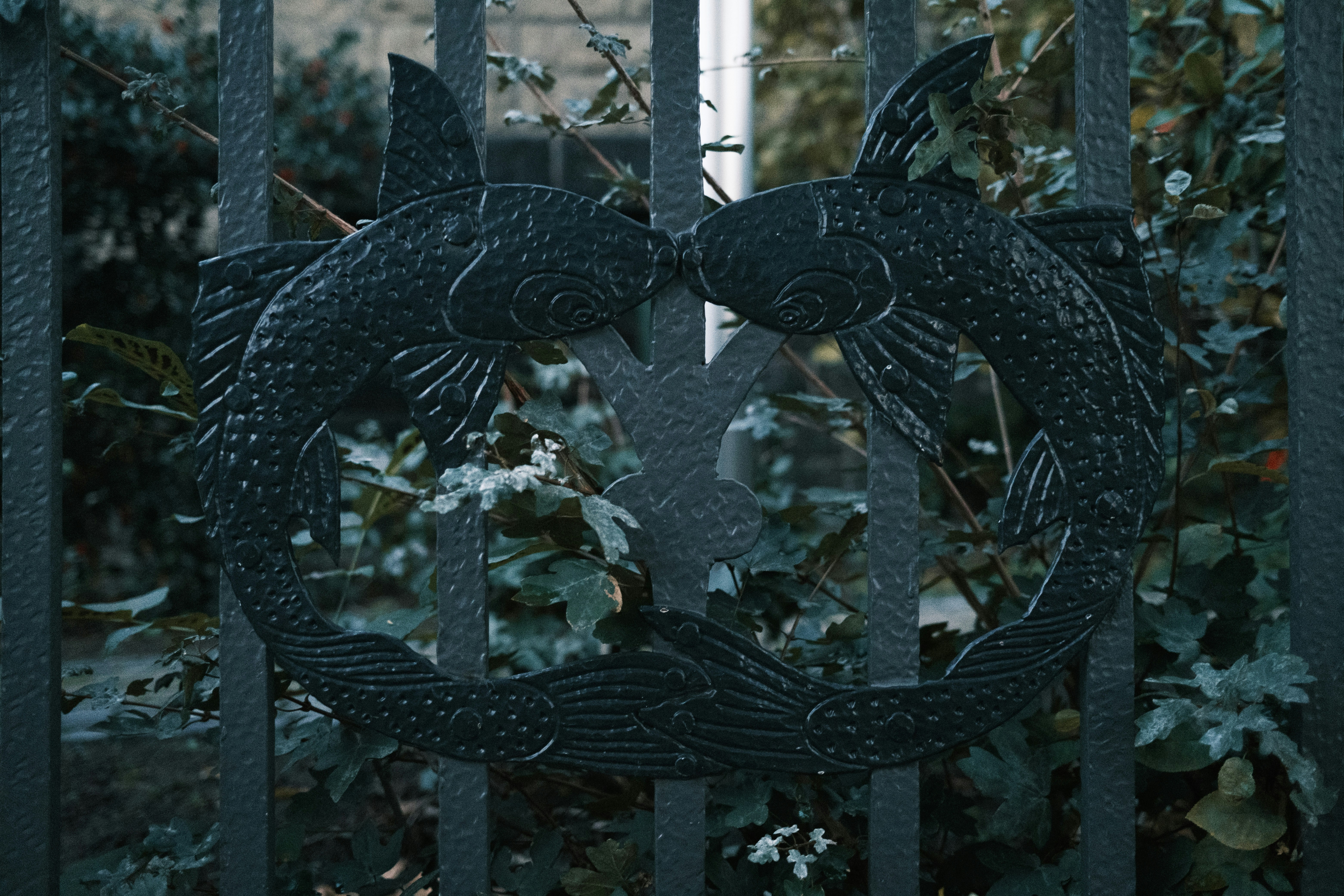 Iron Gate Emblem: A Dark Visage of Metal Leaves