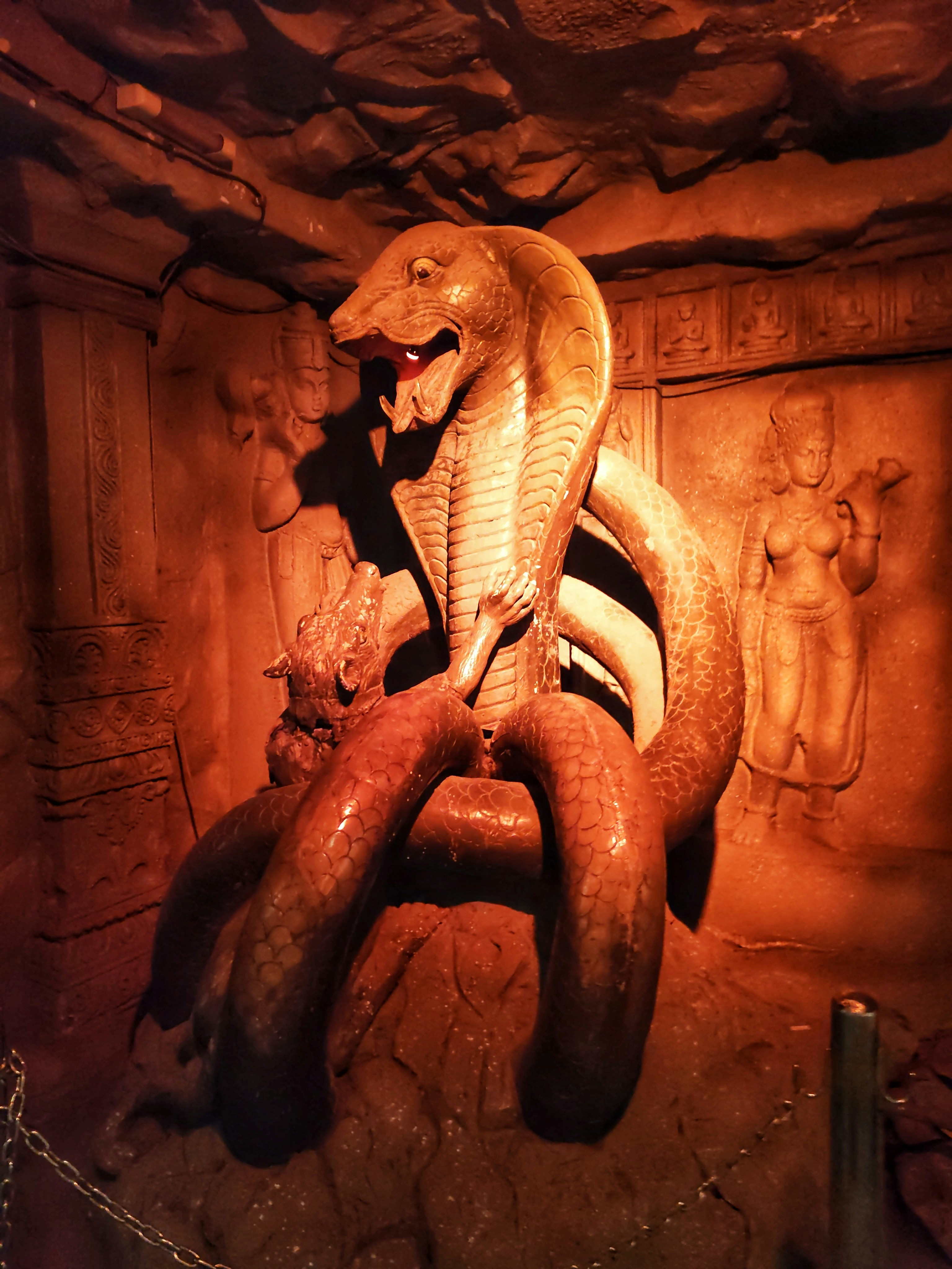 Cobra in Carved Chamber: A Coiled Guardian of Stone