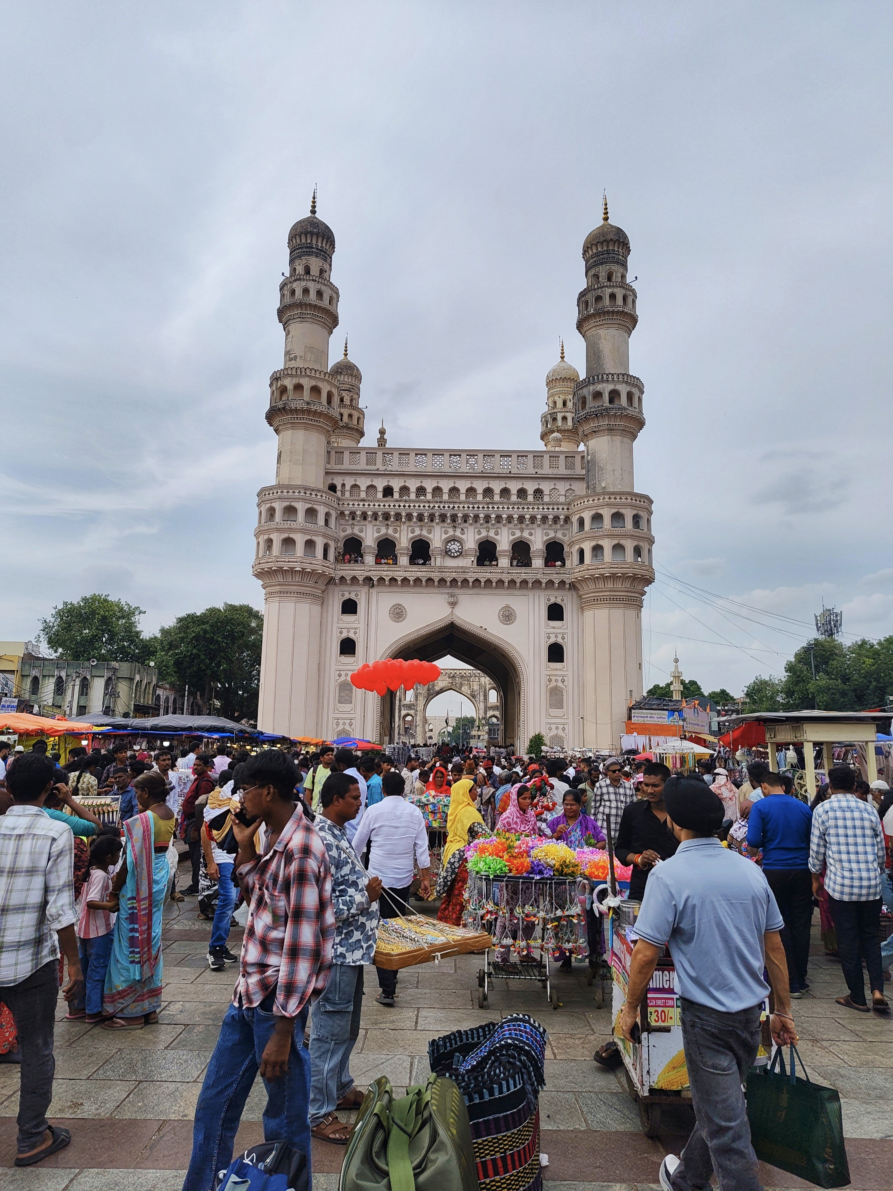 Gate of the City: A Bustling Market Framing Amaravati’s Arch