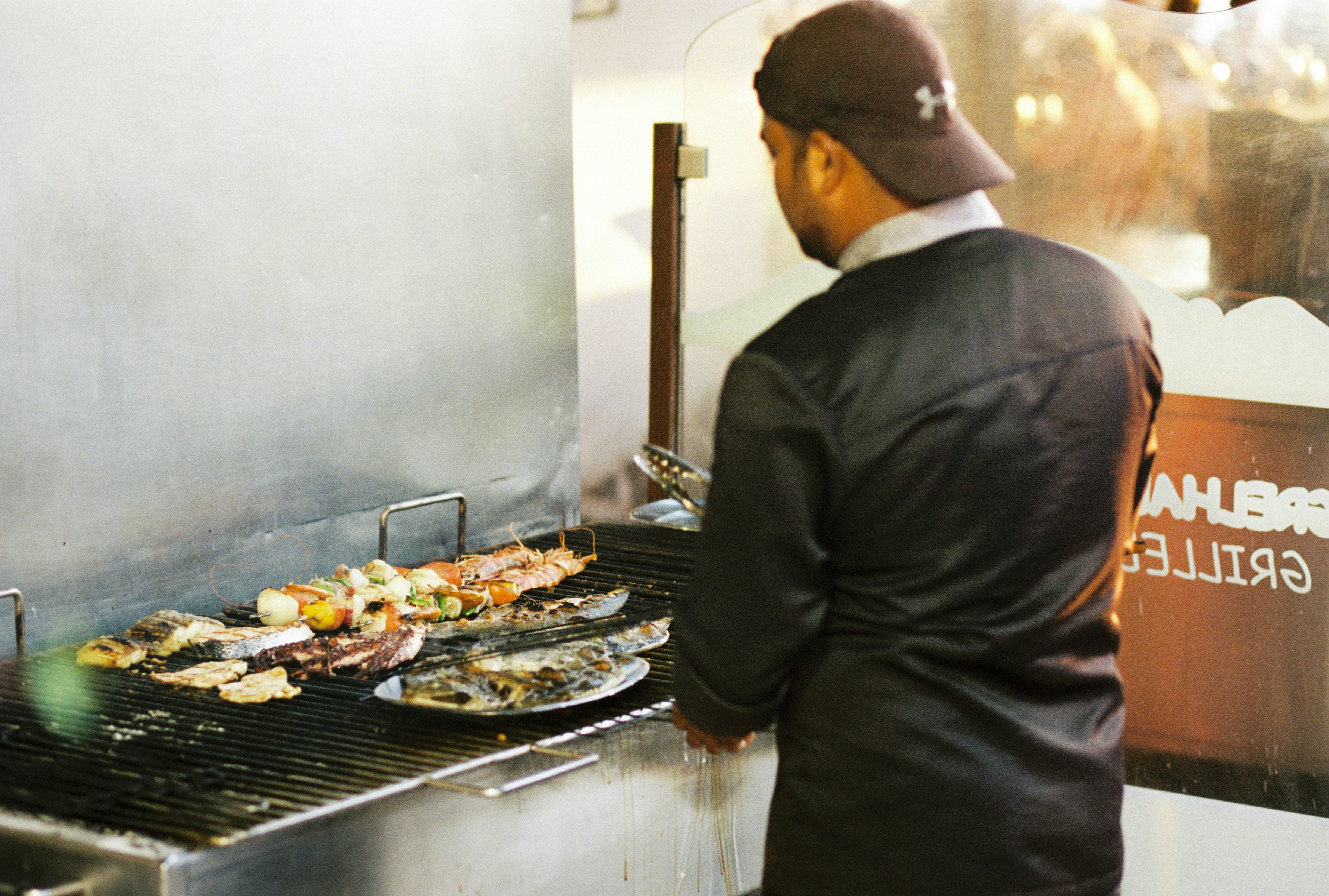 Grillmaster at Work: Behind the Flame and Plate