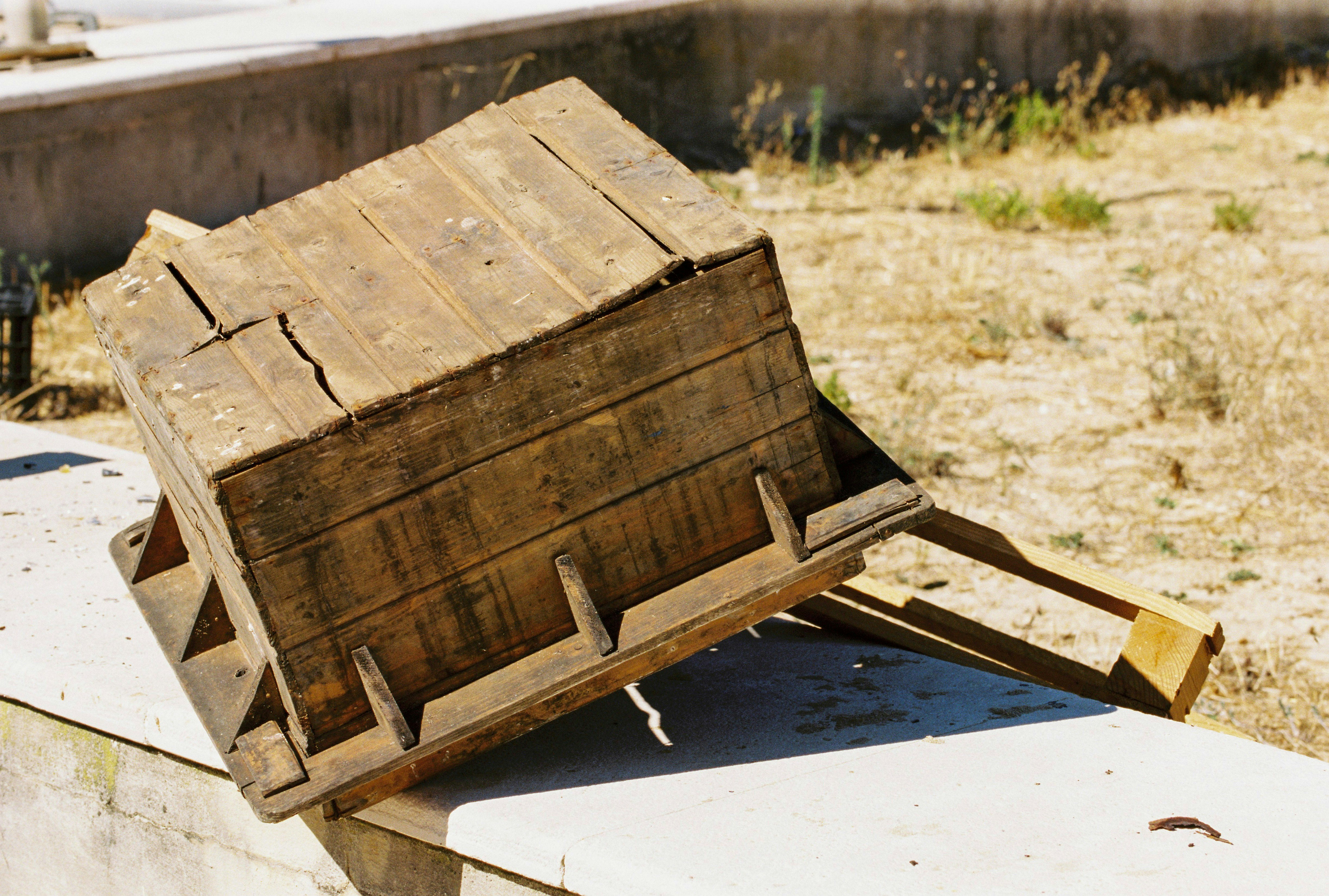 Weathered Crate Resting on a Concrete Platform