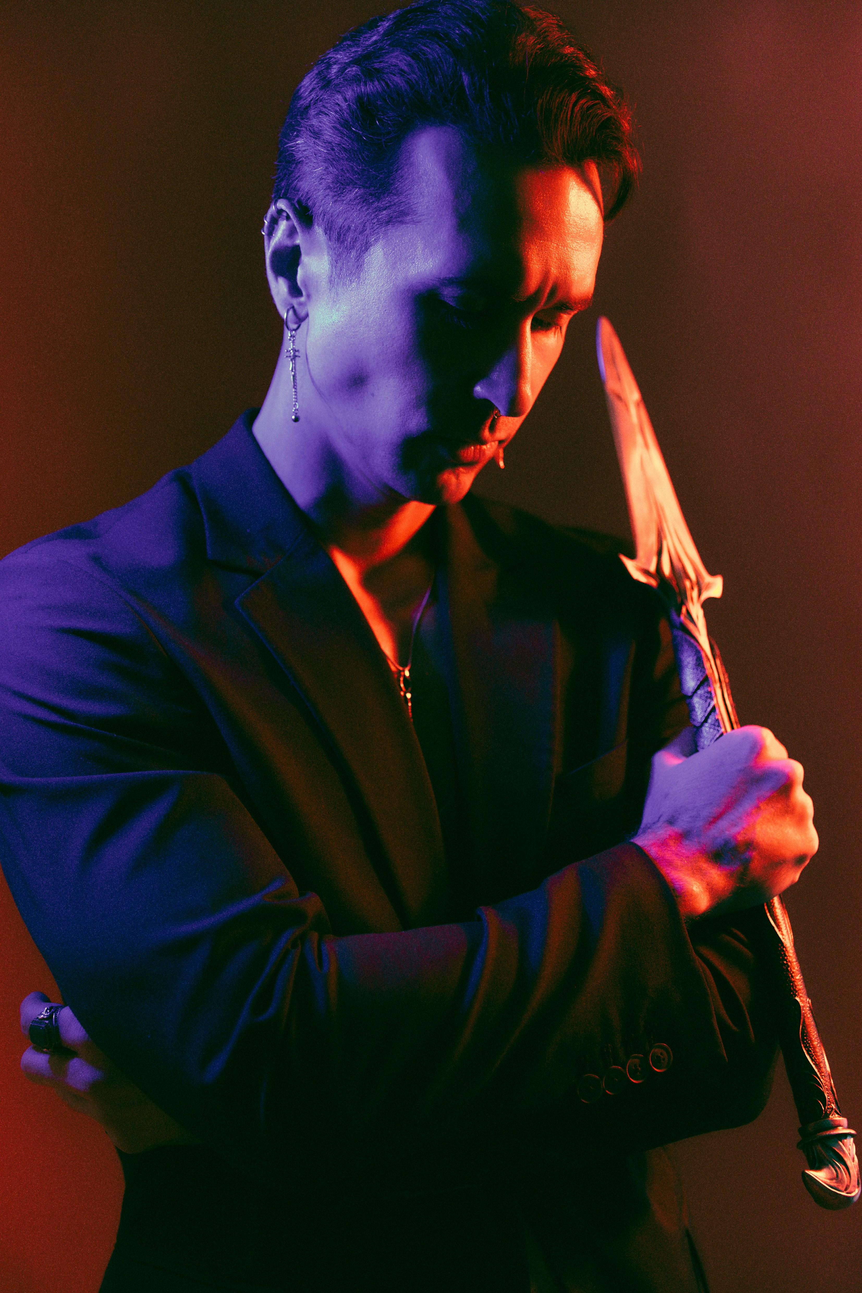 Shadowed Blade: A Portrait of Focus and Fire