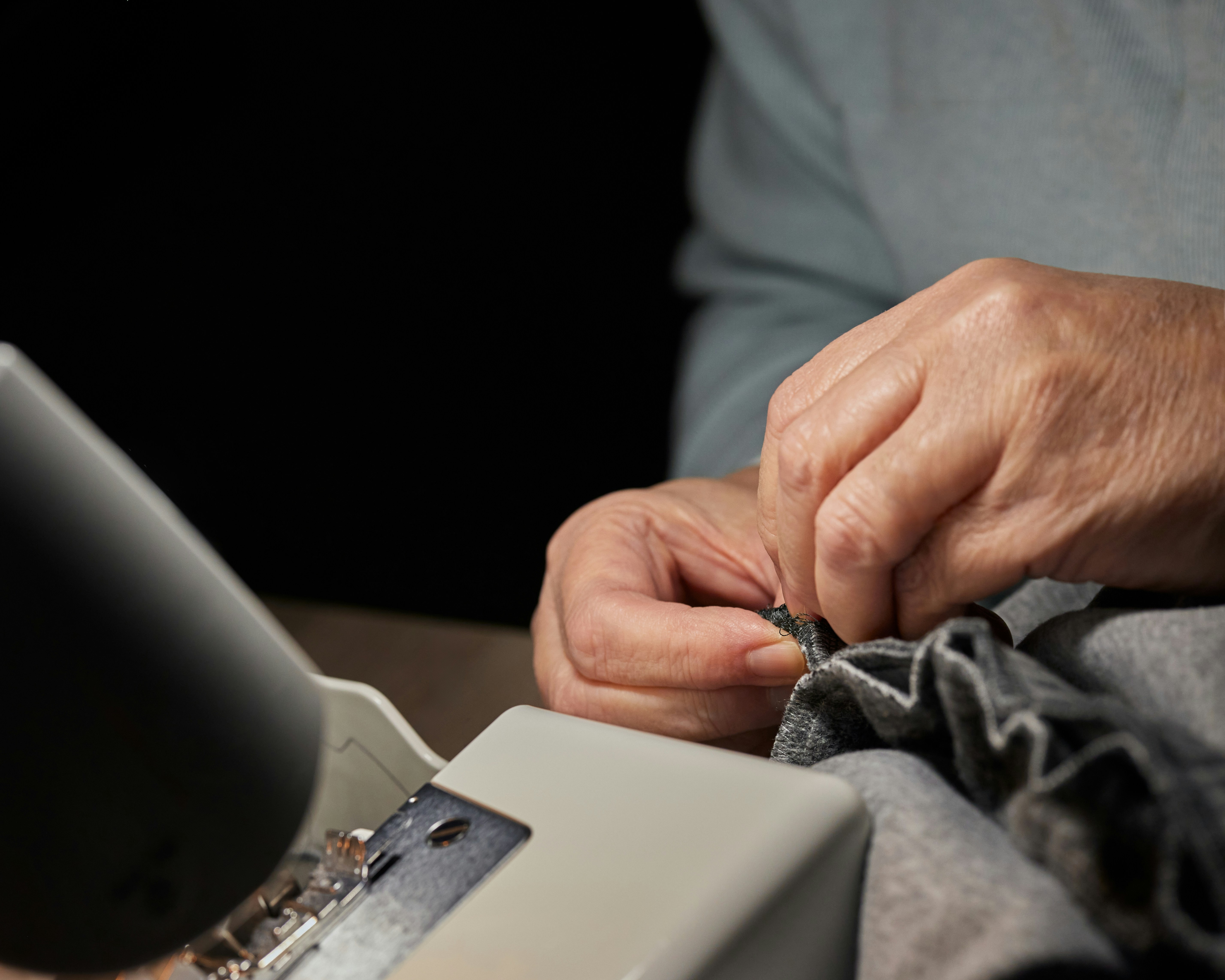 Hands at the Needle: Crafting Detail in Soft Focus