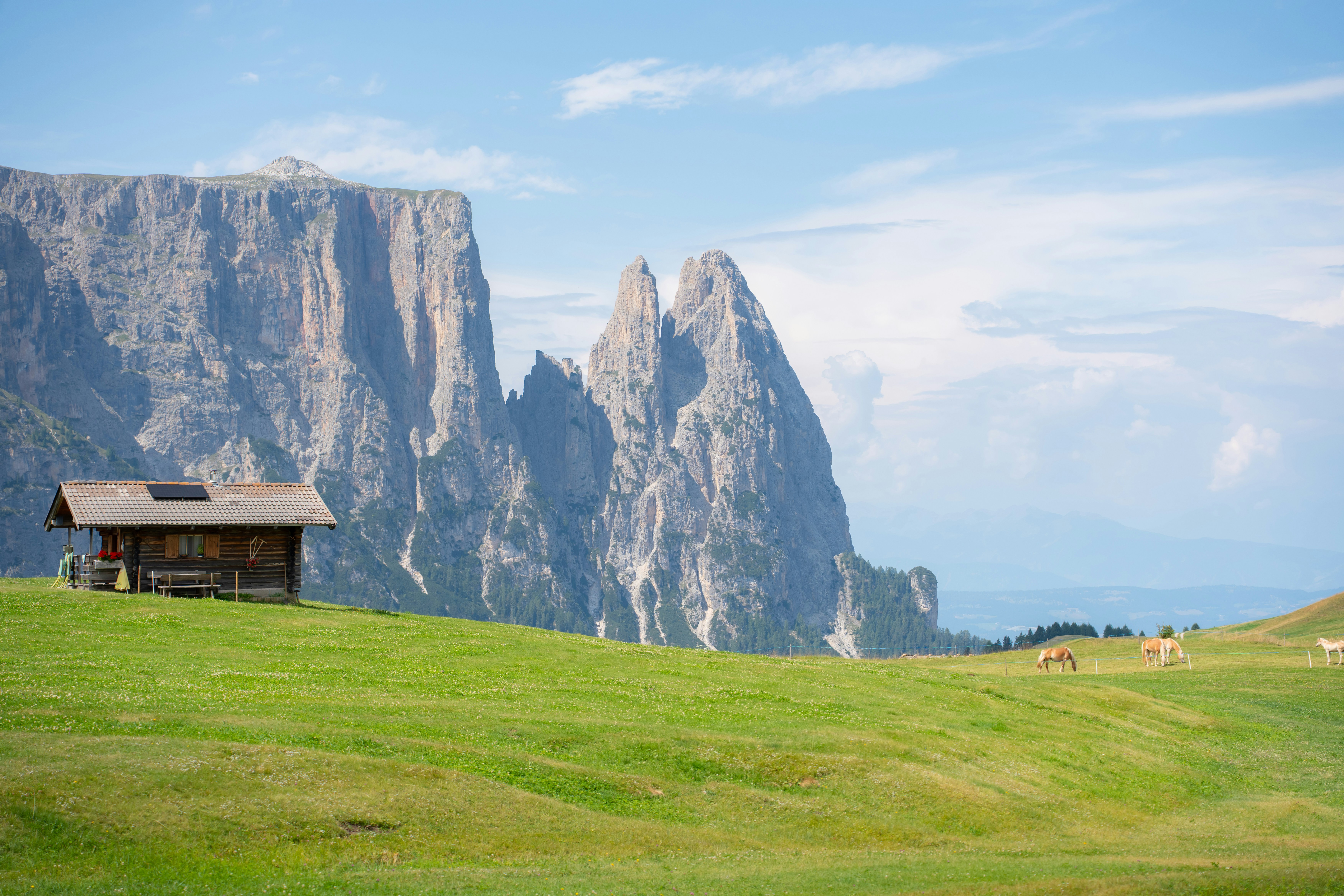 Alpine Cabin at the Foot of Skyscraping Dolomitic Peaks