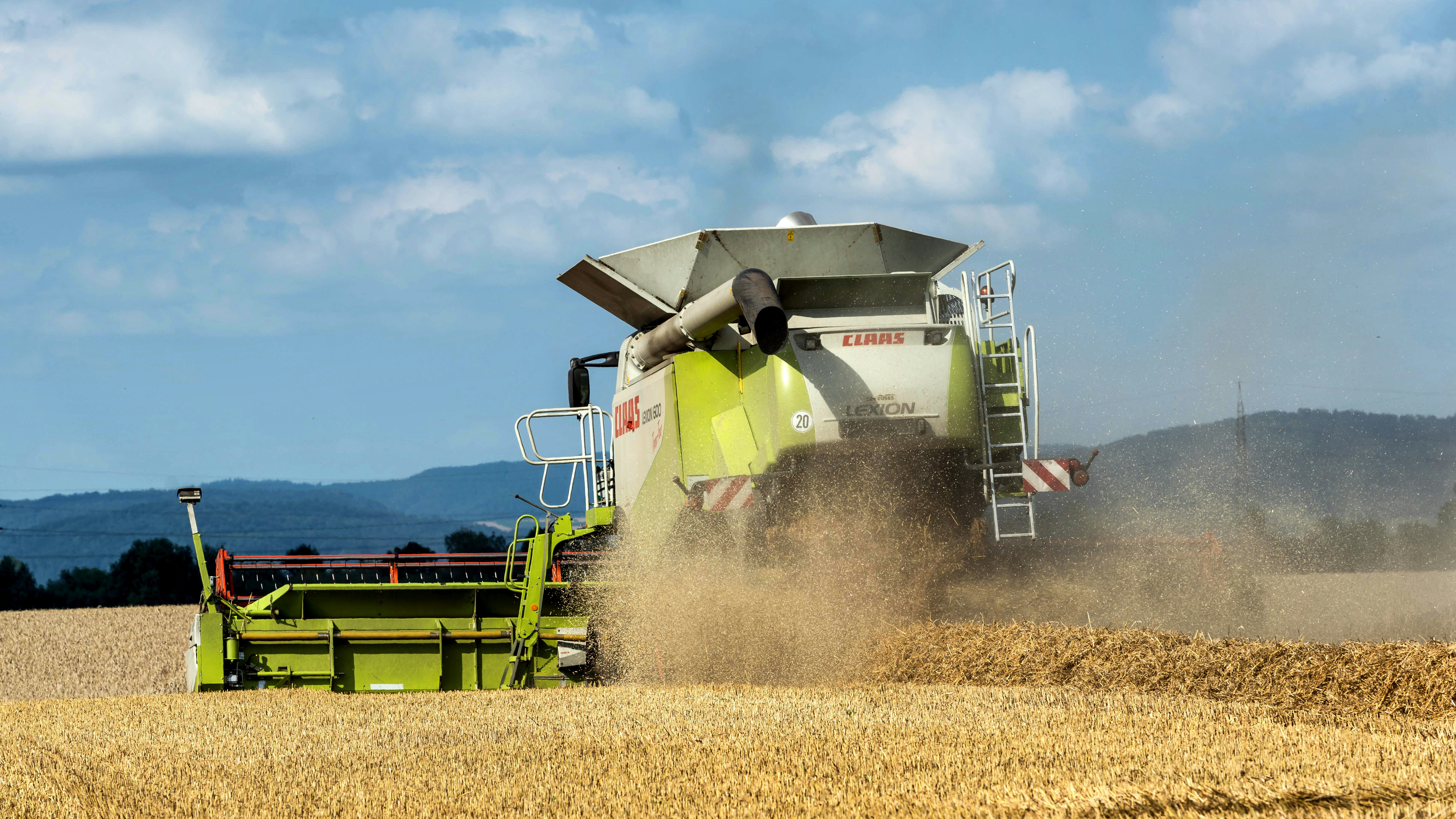 Harvest at Dawn: The Combine Forges Dust into Gold