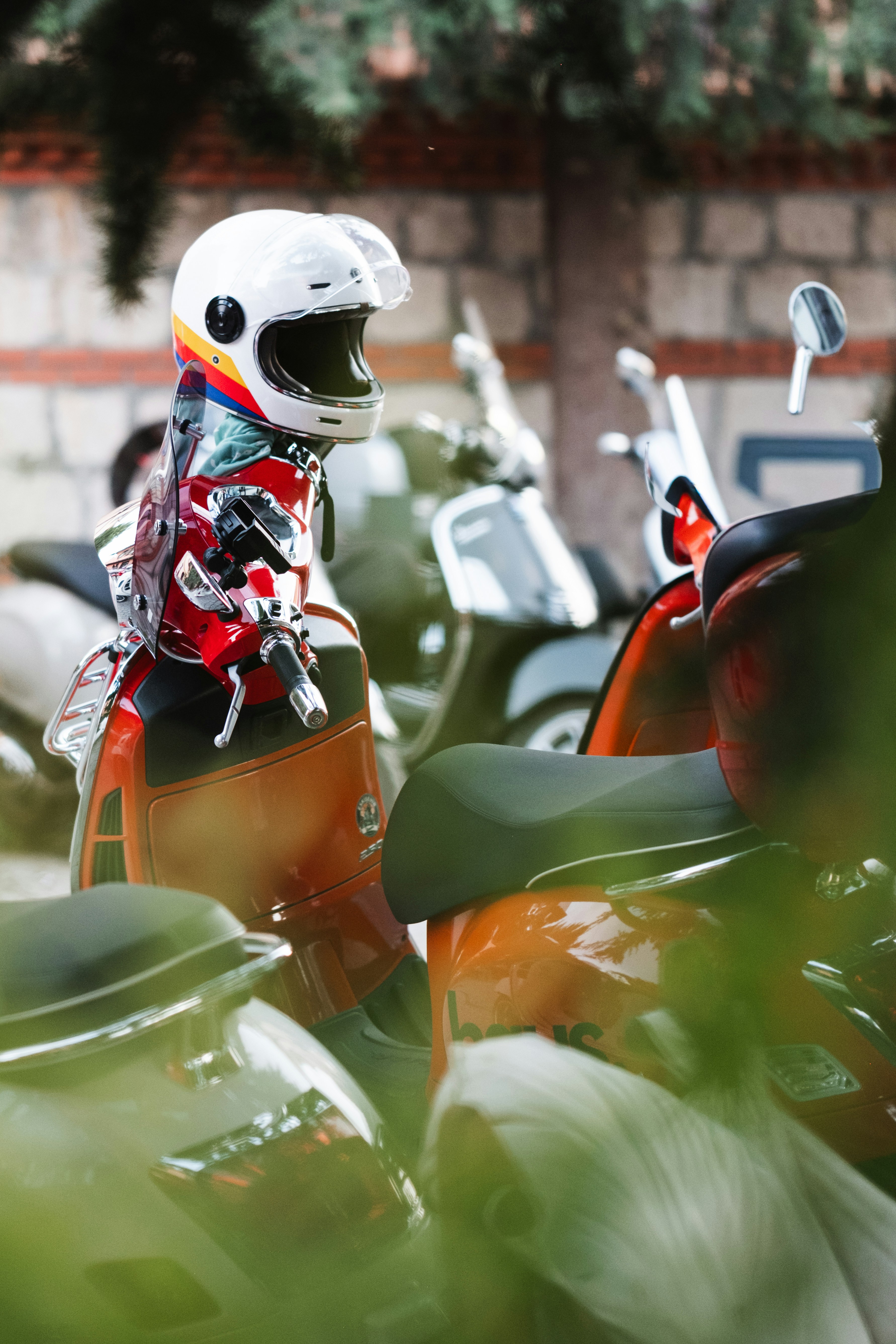 Helmeted Hero in a Sea of Chrome: A Scooter Parade