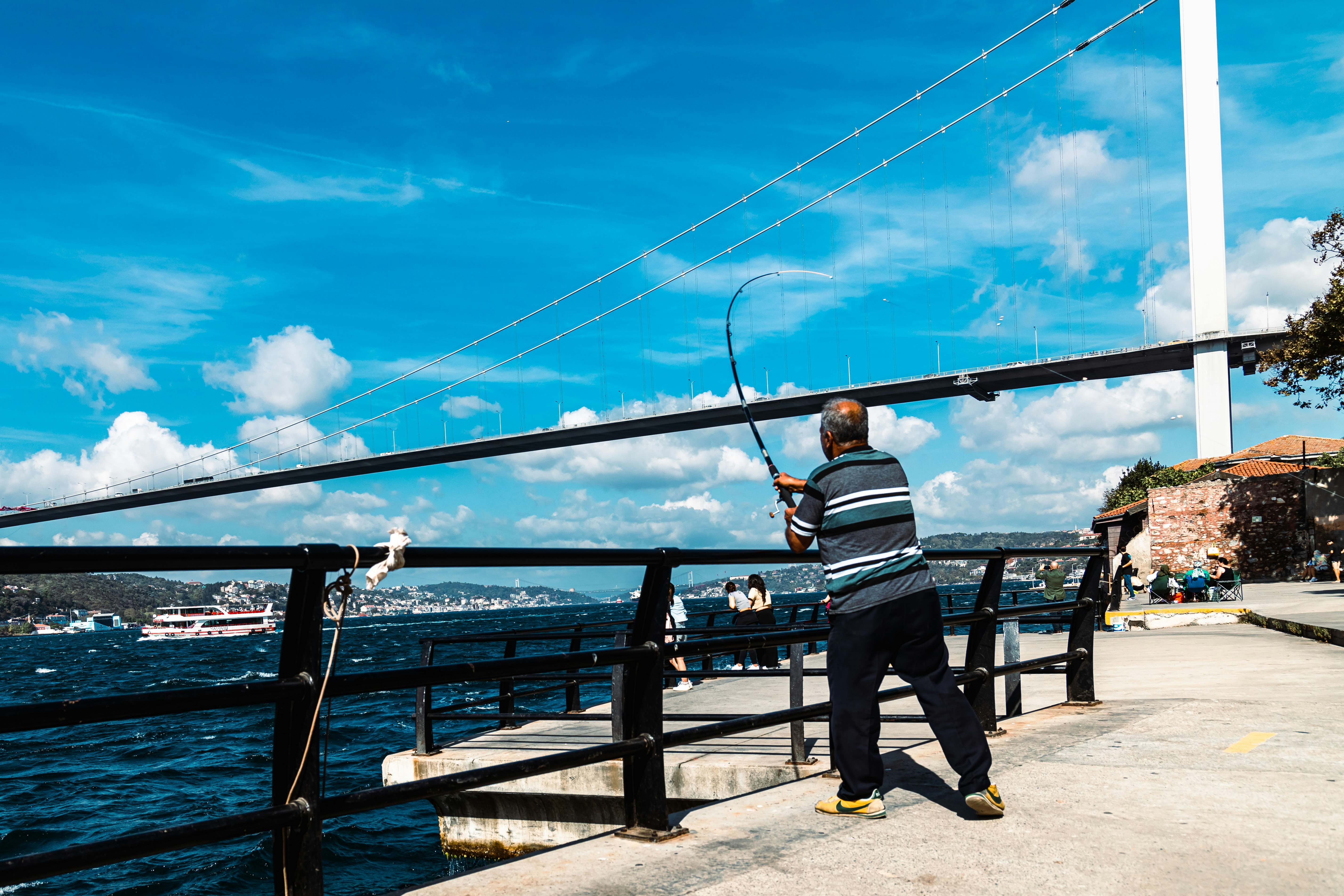 Harnessing the Horizon: A Fisherman at the Waterfront