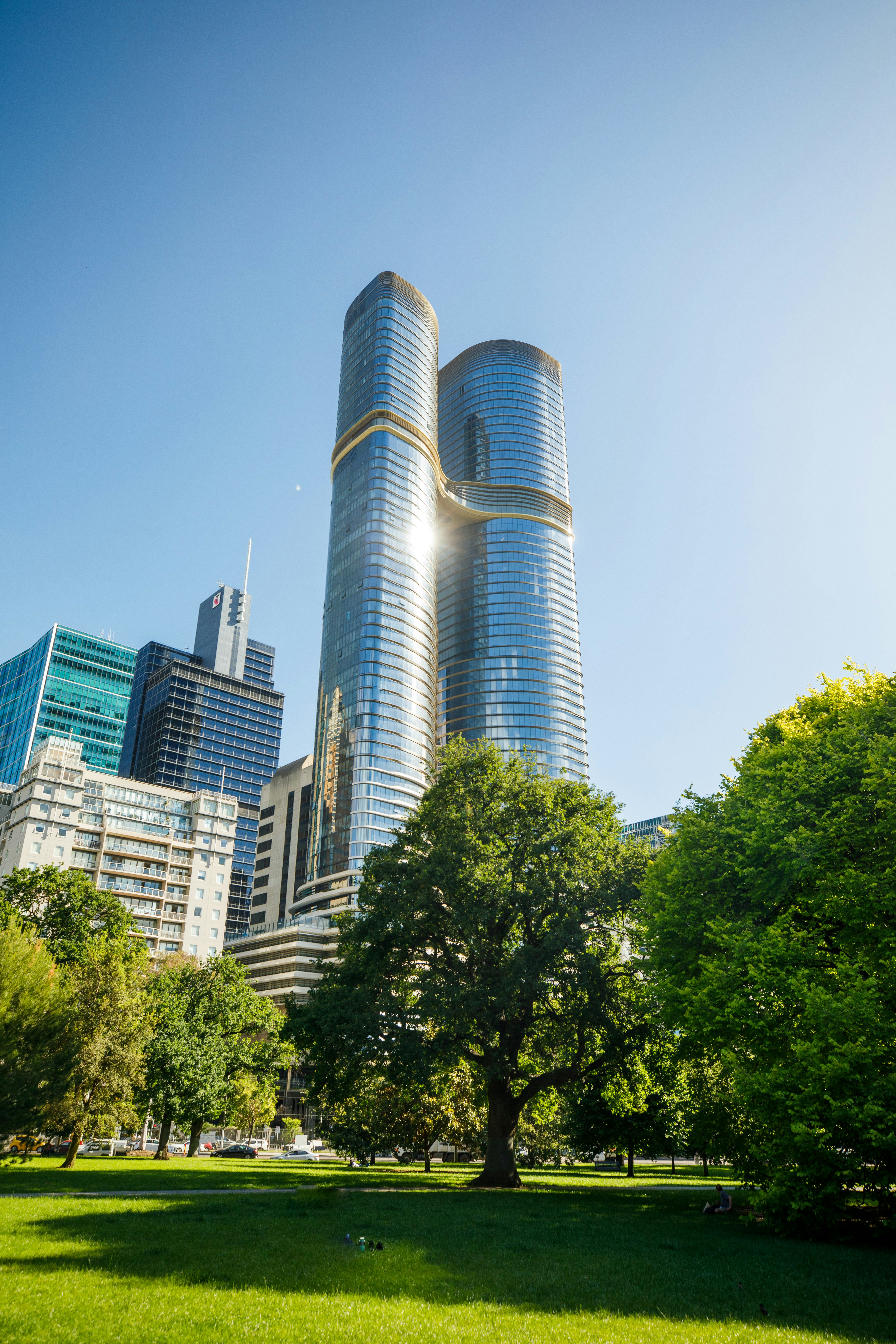 Twin Glass Towers Lean Into the Light