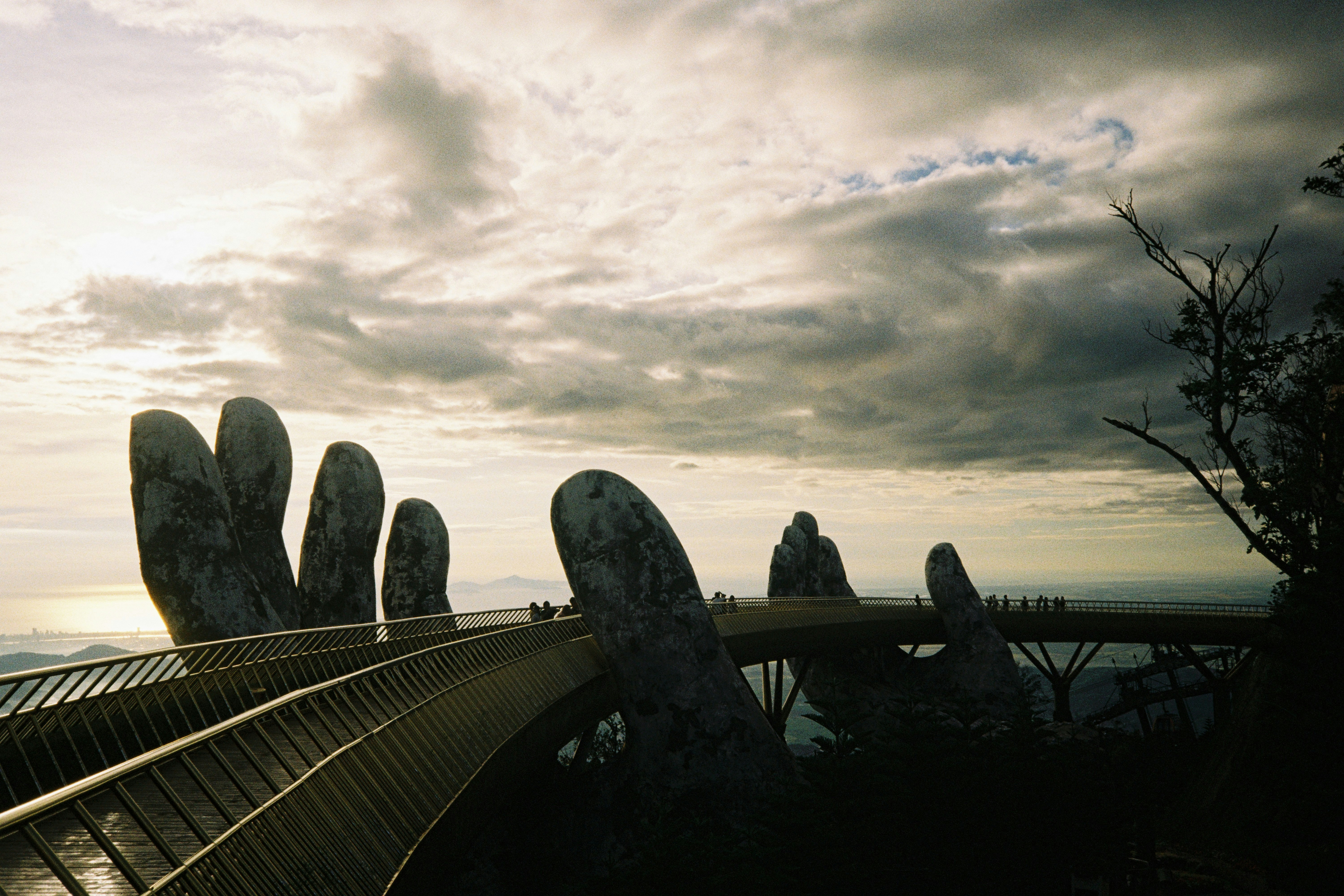 Stone Ring Bridge at Dusk: Hands of Stone Reach Toward the Sea