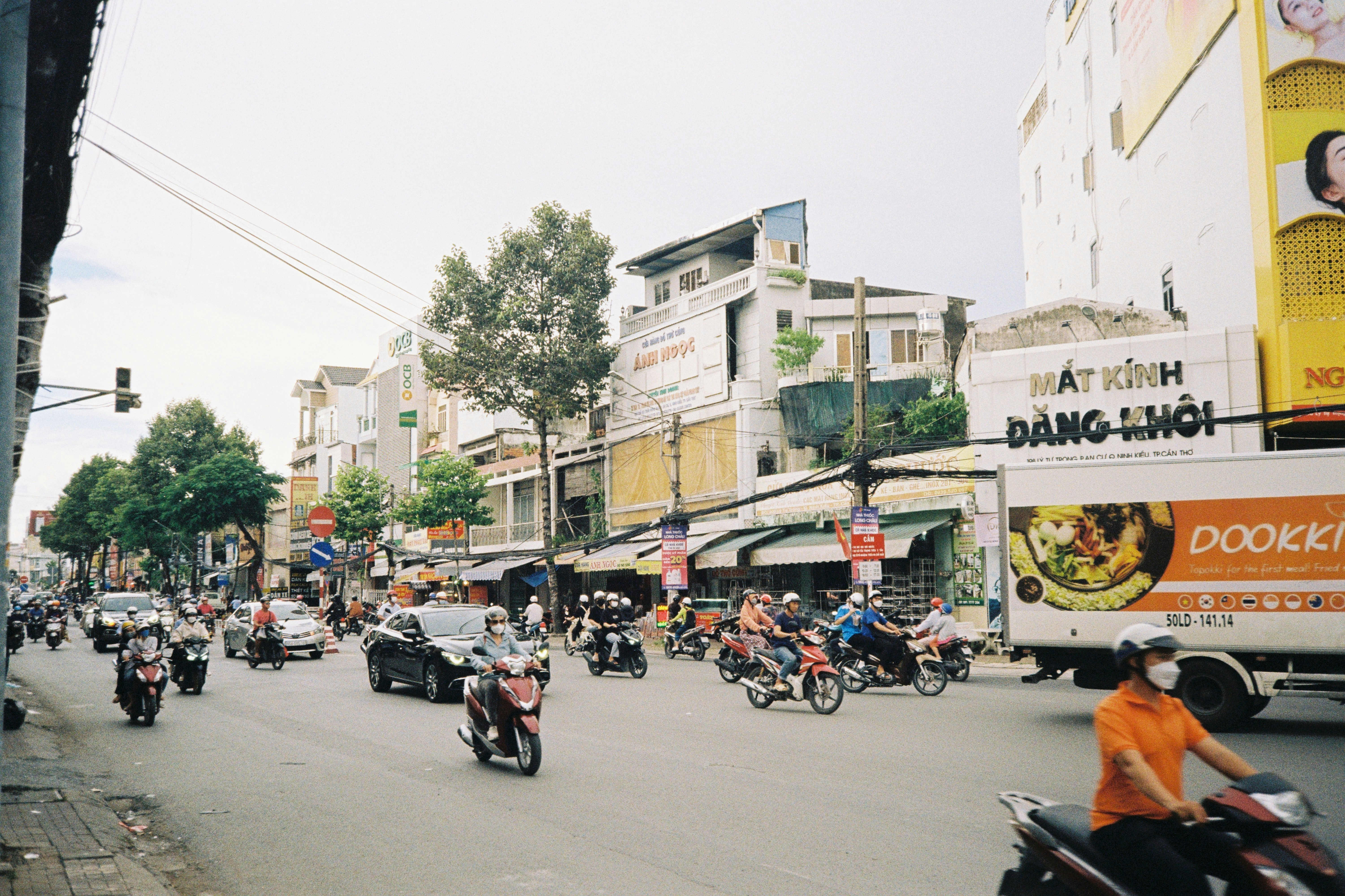 City Pulse: Motorbikes and Market Street in Vibrant Motion