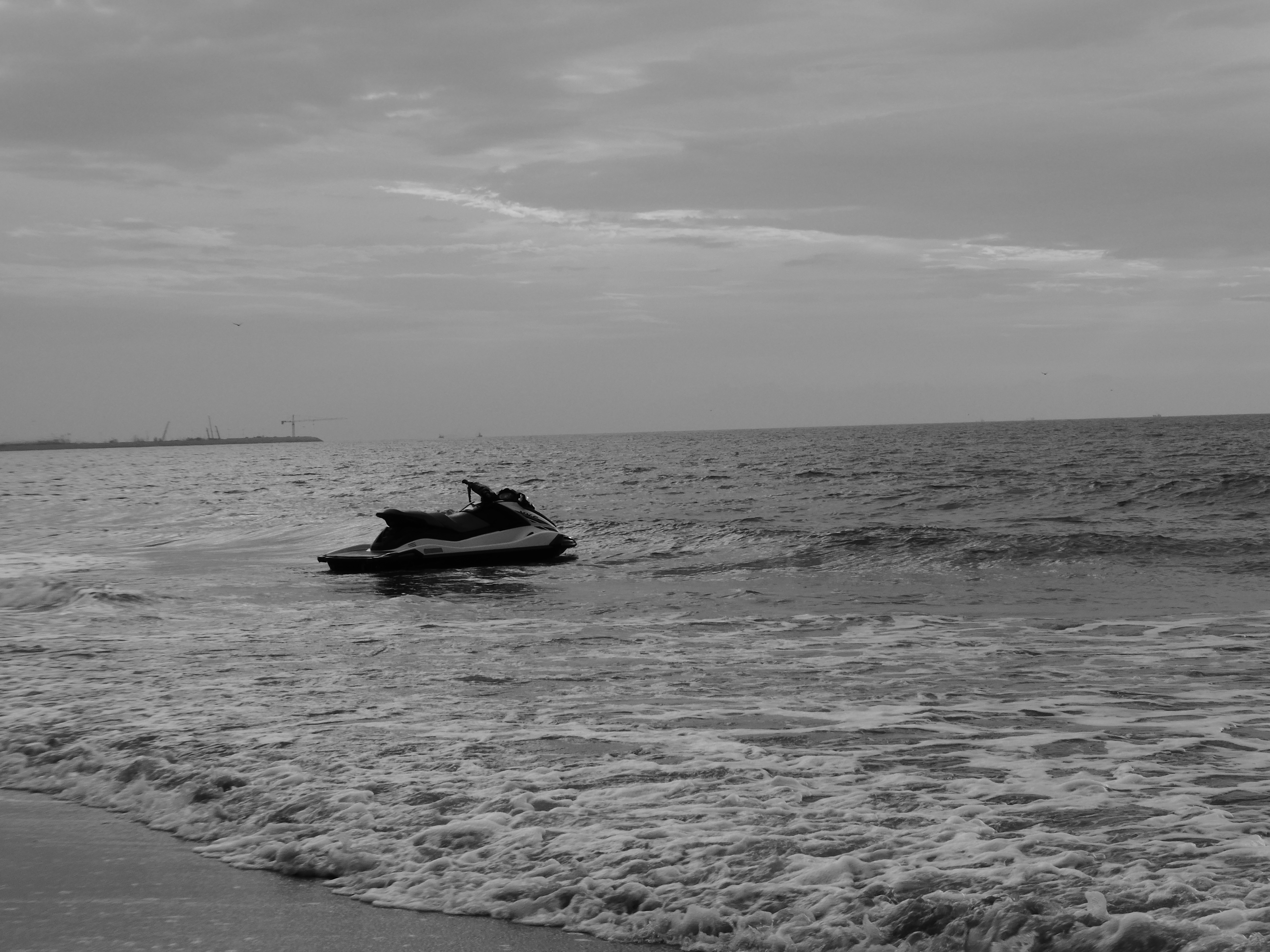 Jet Ski Cut Across the Quiet Coastal Line