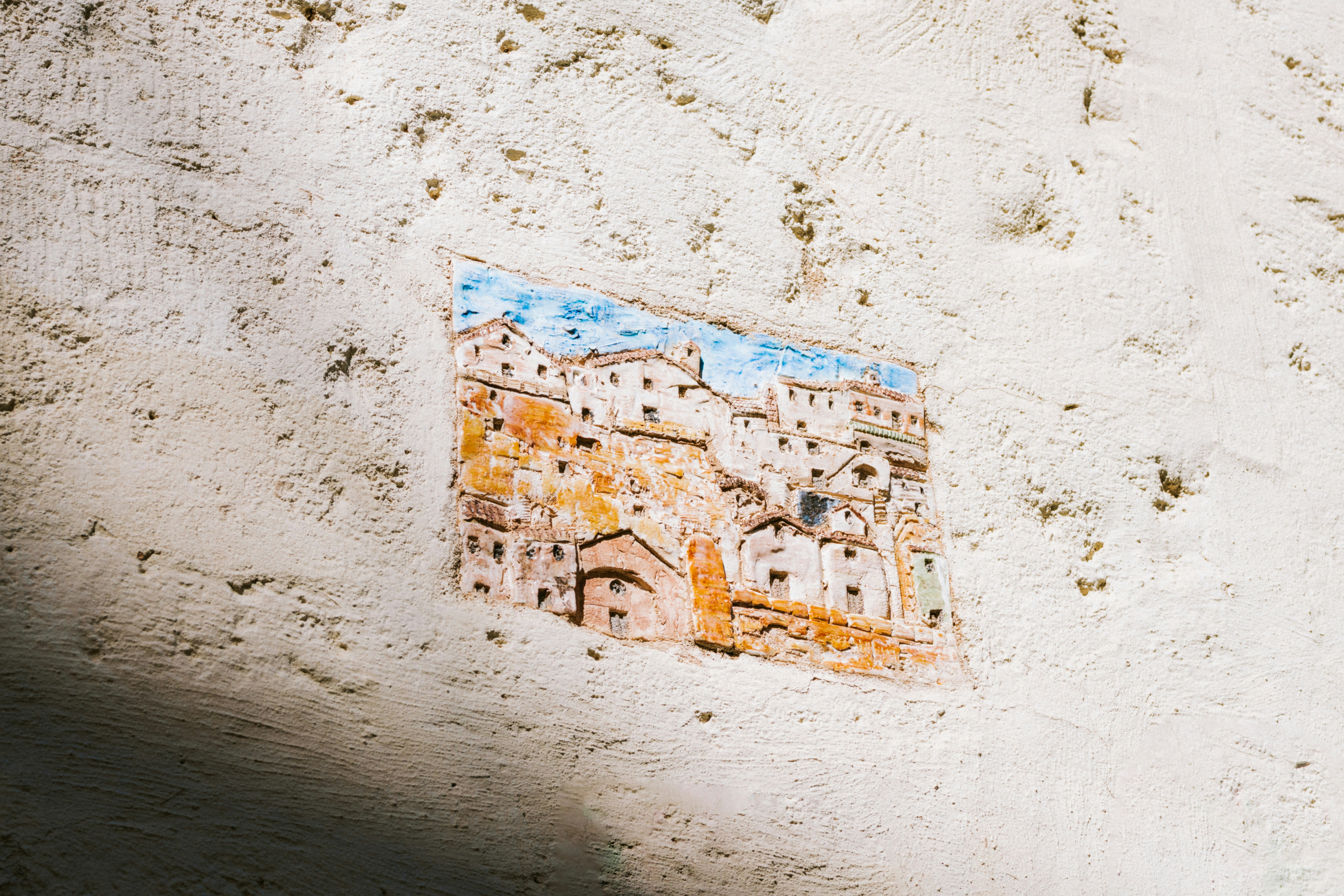 Patch of Painted Town on a Sunlit Wall