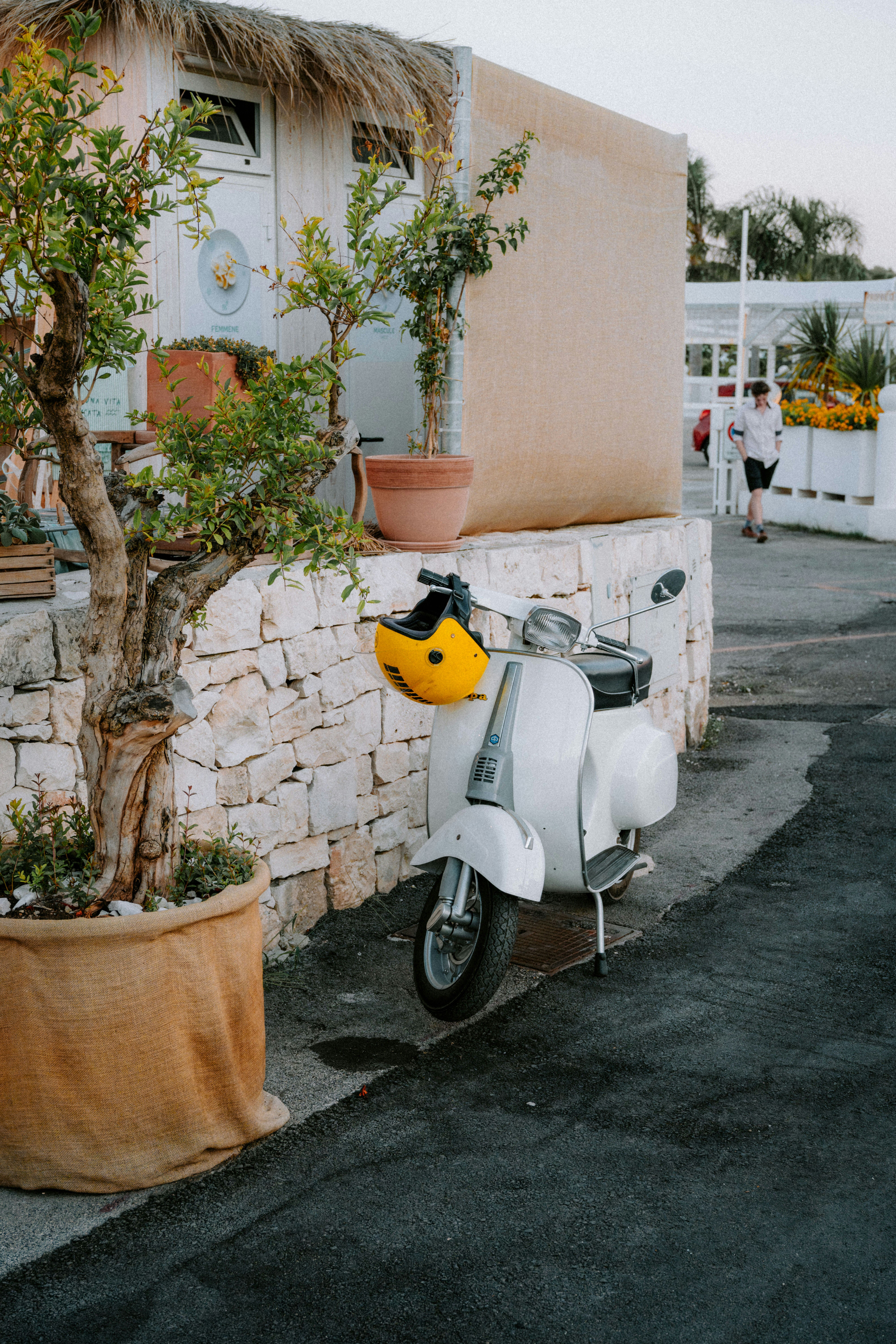 The Quiet Vespa at the Edge of a Sunlit Courtyard